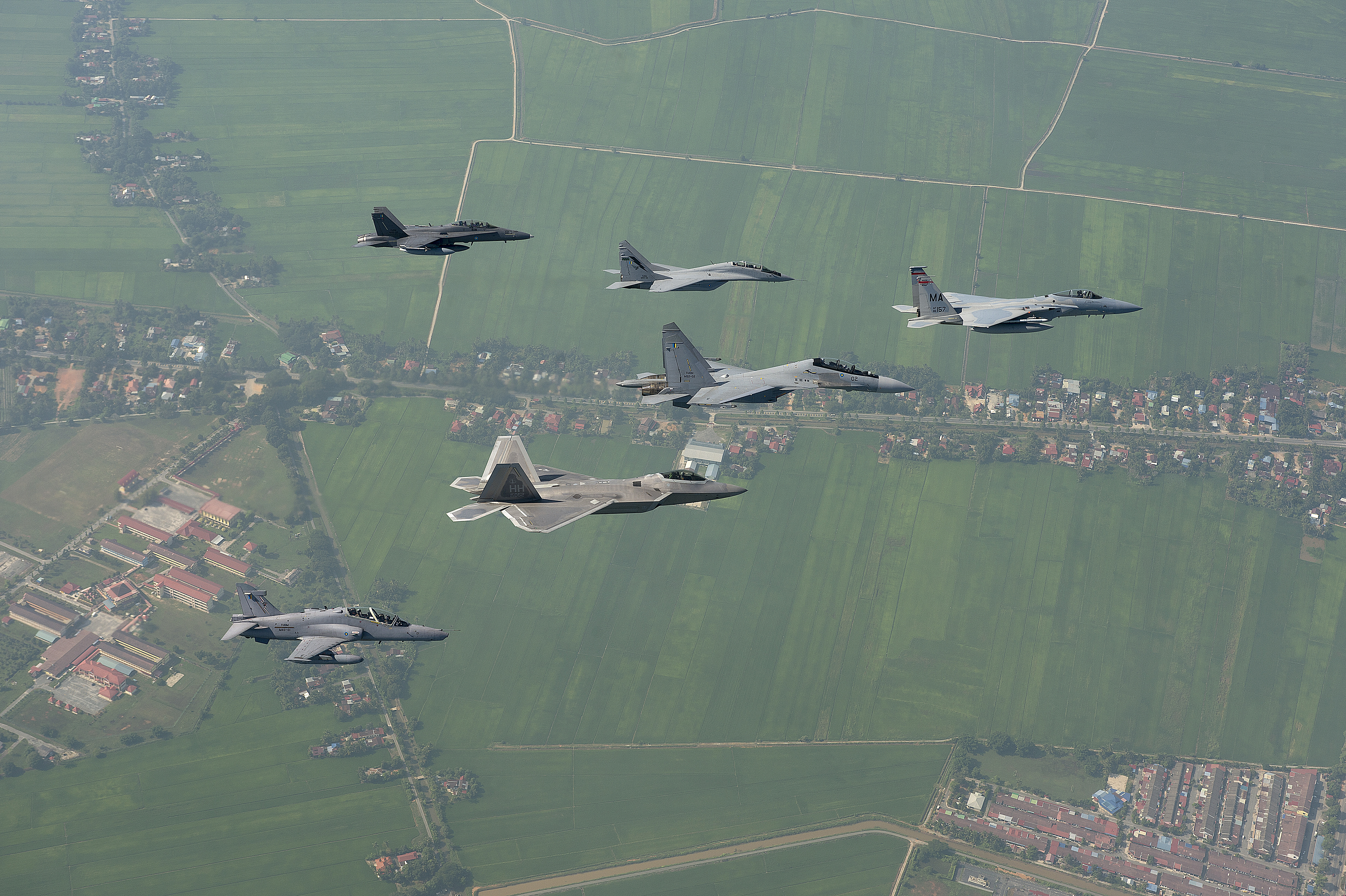 A formation of U.S. Air Force and Royal Malaysian Air Force aircraft ...