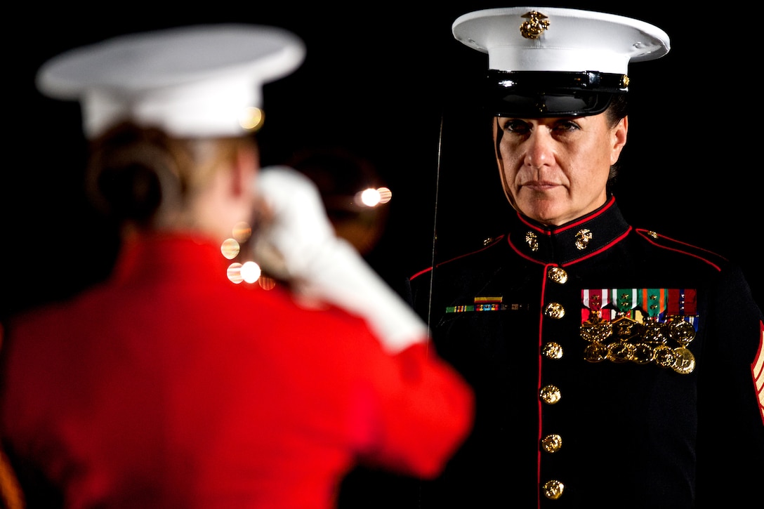 A U.S. Marine Band member performs in front of Marine Corps Sgt. Maj ...
