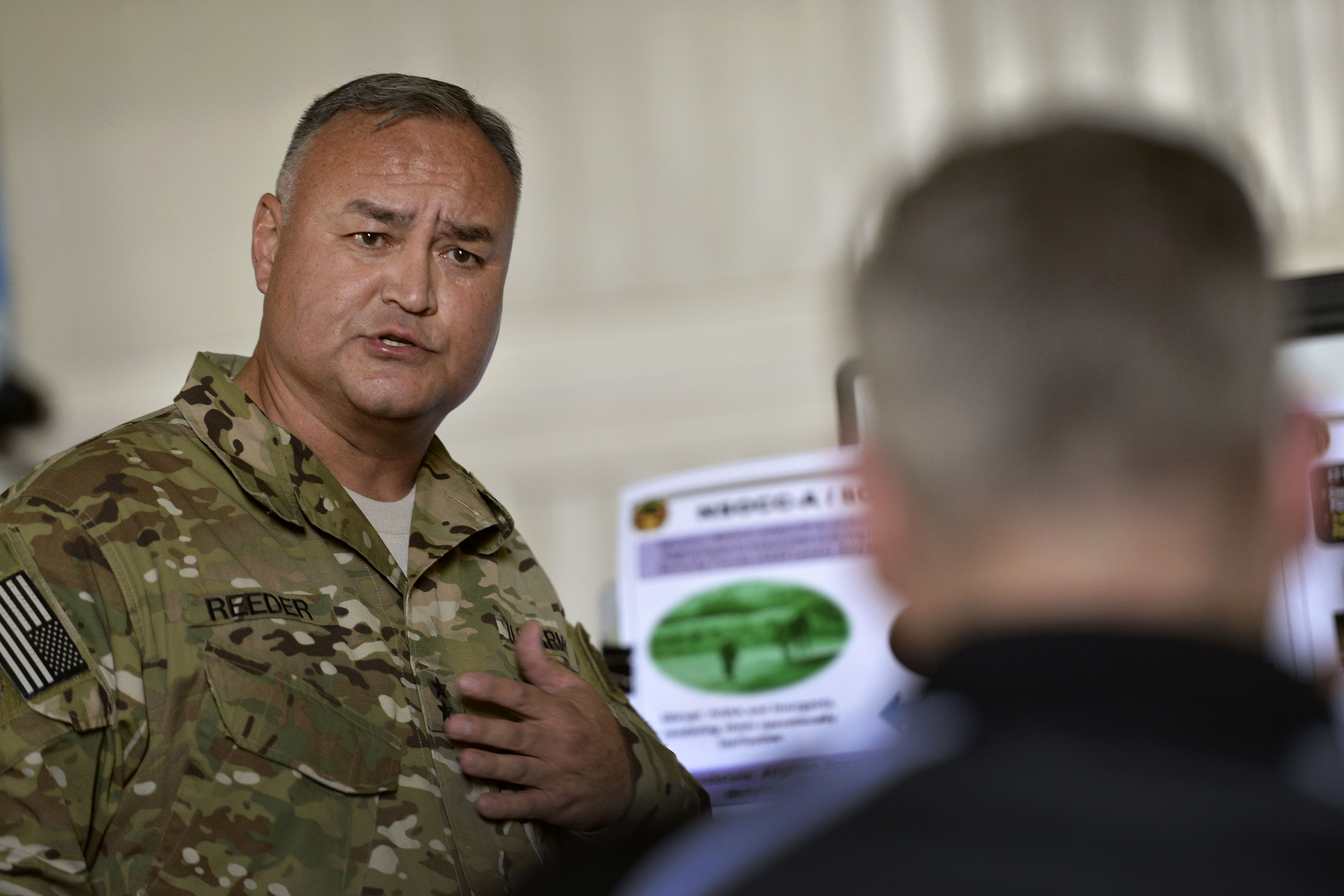 U.S. Deputy Defense Secretary Bob Work receives a briefing by U.S. Army ...