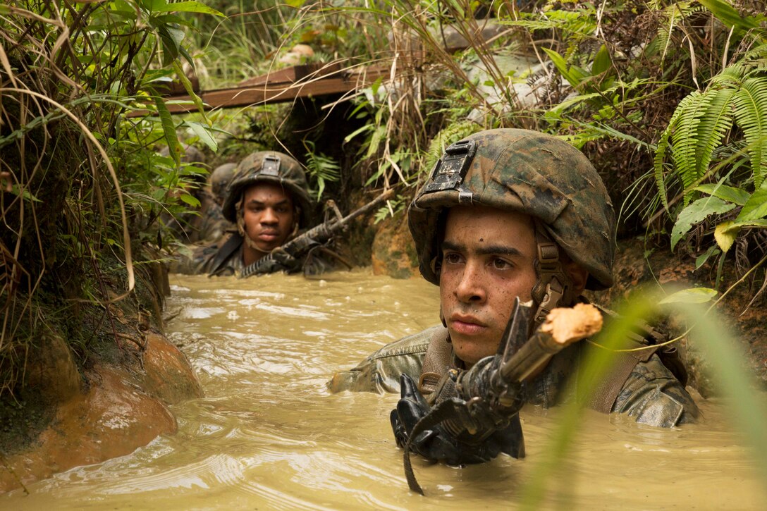 U.S. Marine Corps Cpl. Christian Hiraldo leads Marines and sailors ...