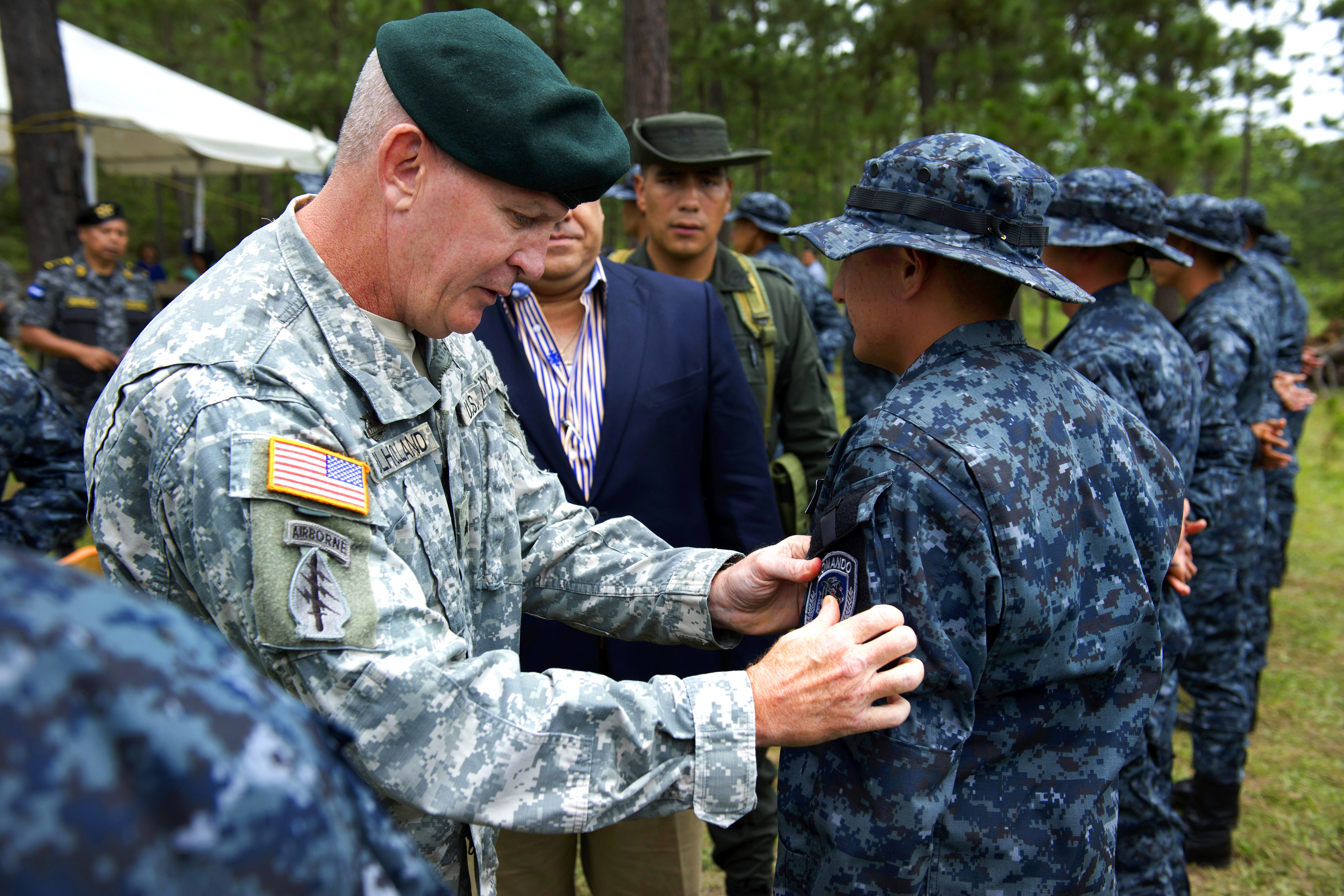 U.S. Army Brig. Gen. Sean P. Mulholland, left, commander of Special ...