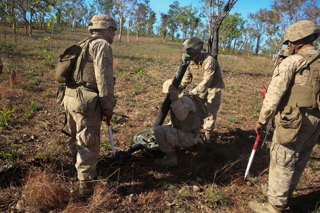 U.S. Marines set up the 81mm mortar system during a crewed-served ...