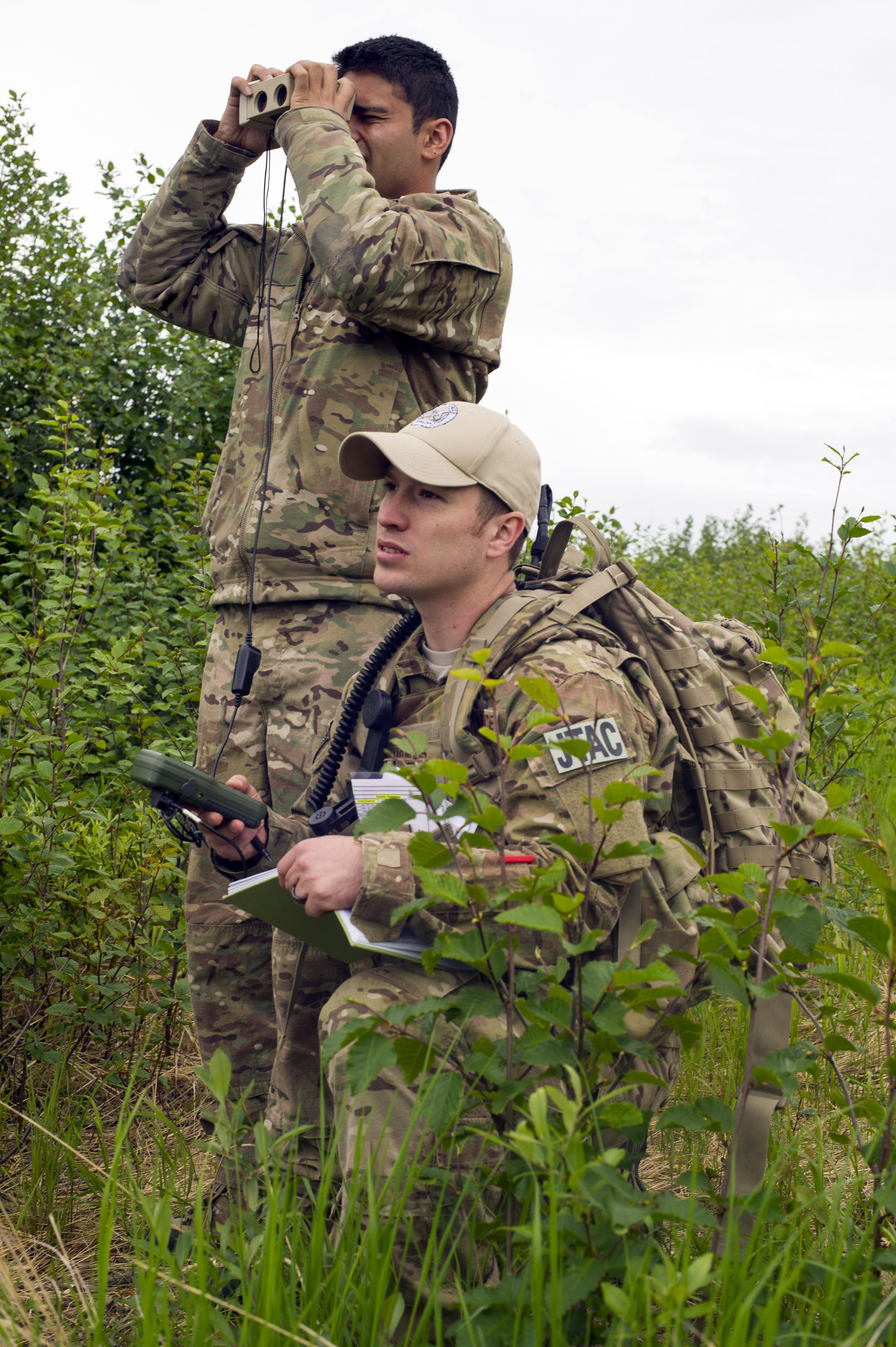 Air Force airmen plot target data on a map during Exercise Red Flag ...