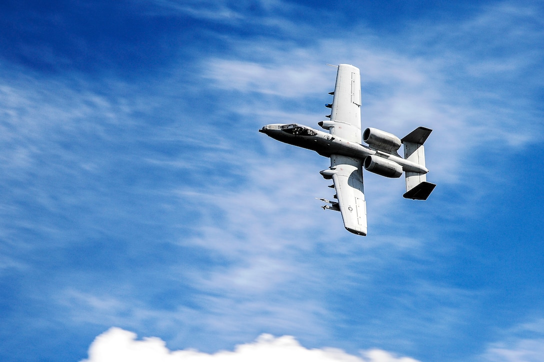 An A-10 Thunderbolt II performs a show-of-force maneuver during ...