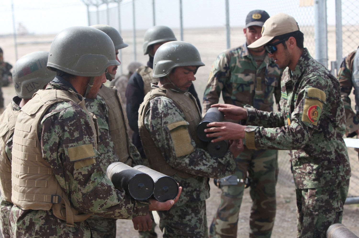 Afghan National Army soldiers familiarize themselves with mortars ...
