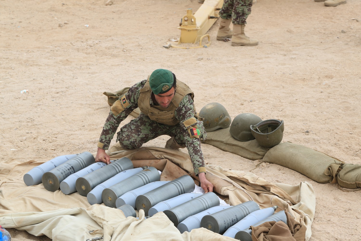 Afghan National Army soldiers fire a 122mm Howitzer 2A18 (D-30)