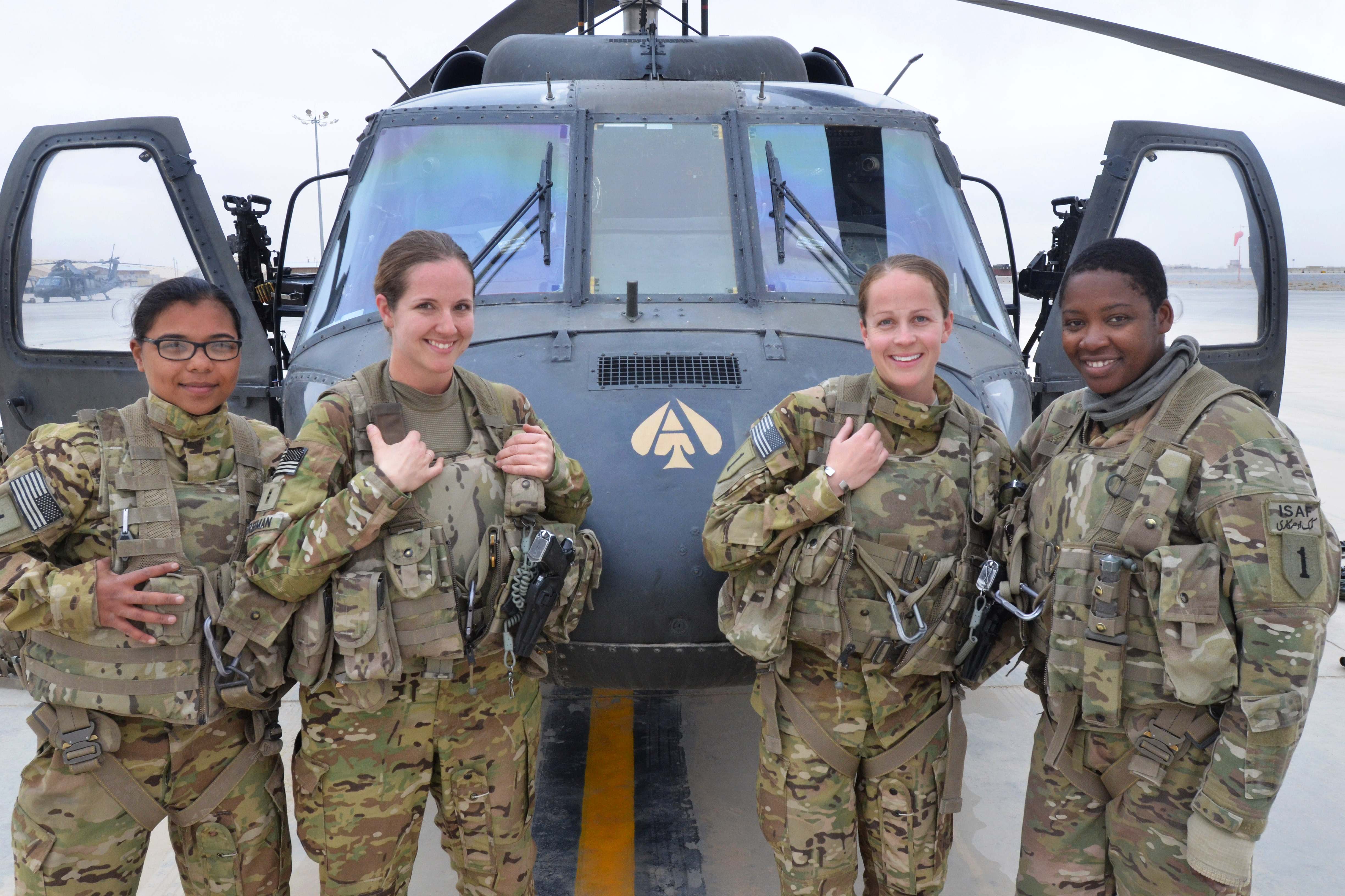 From left to right, U.S. Army Pfc. Ajia Gumabon, U.S. Army Chief ...
