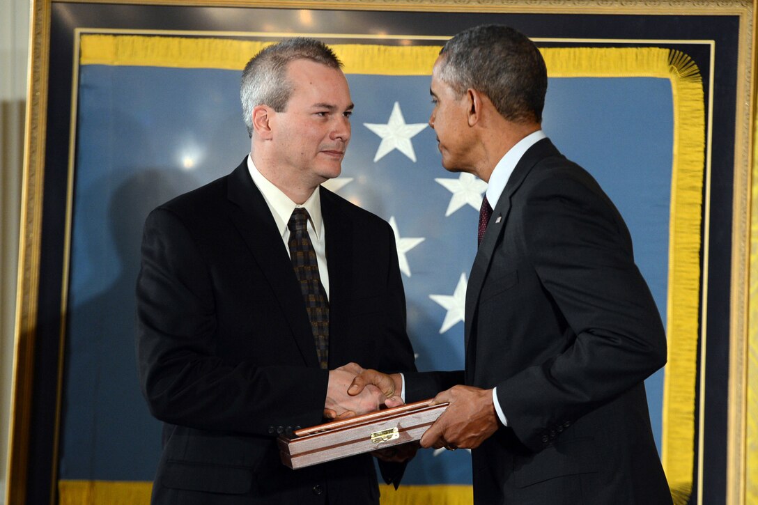Tyronne Espinoza accepts the Medal of Honor on behalf of his late ...