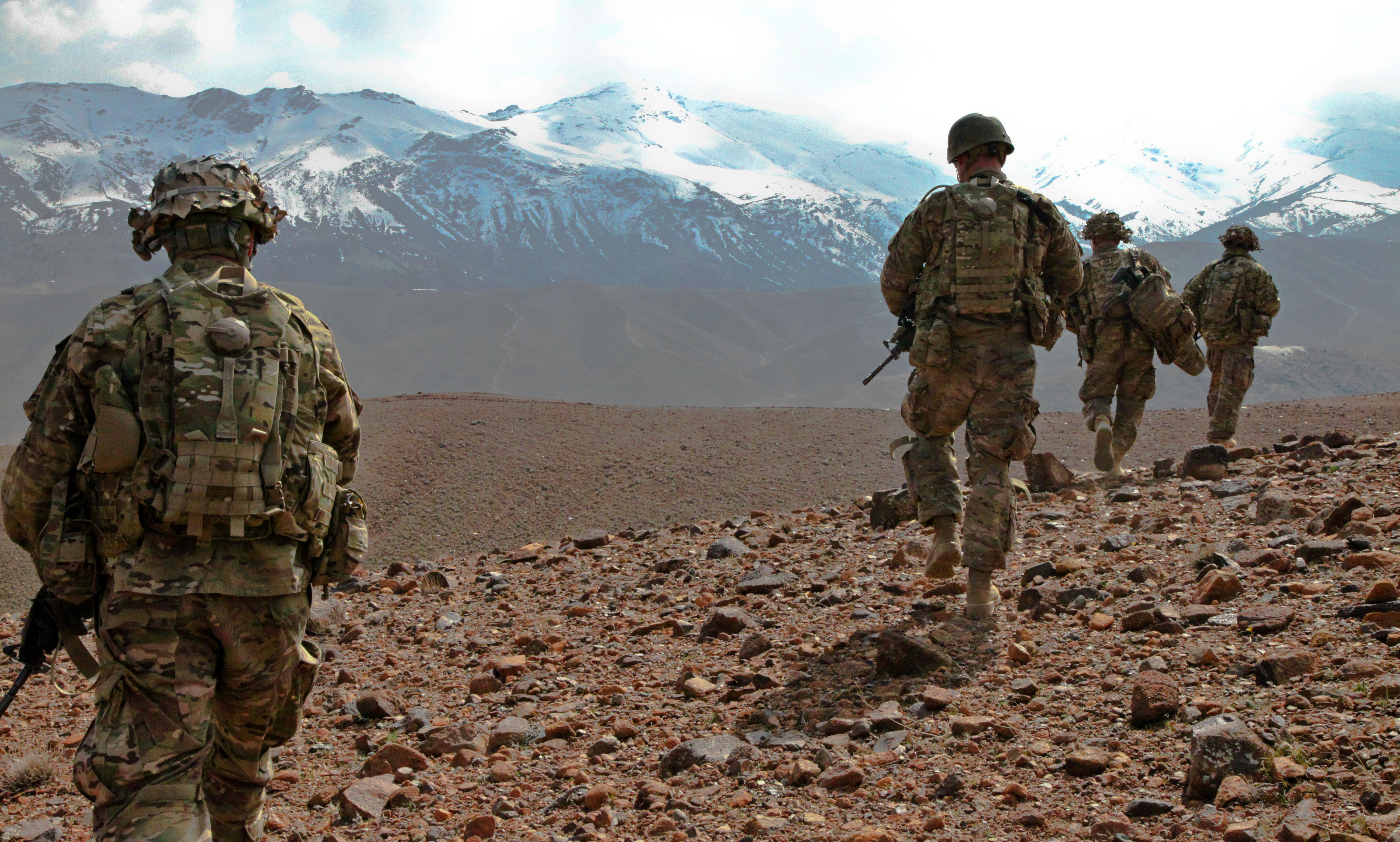 U.S. soldiers walk off the landing zone to Combat Outpost Koh-E-Safi ...