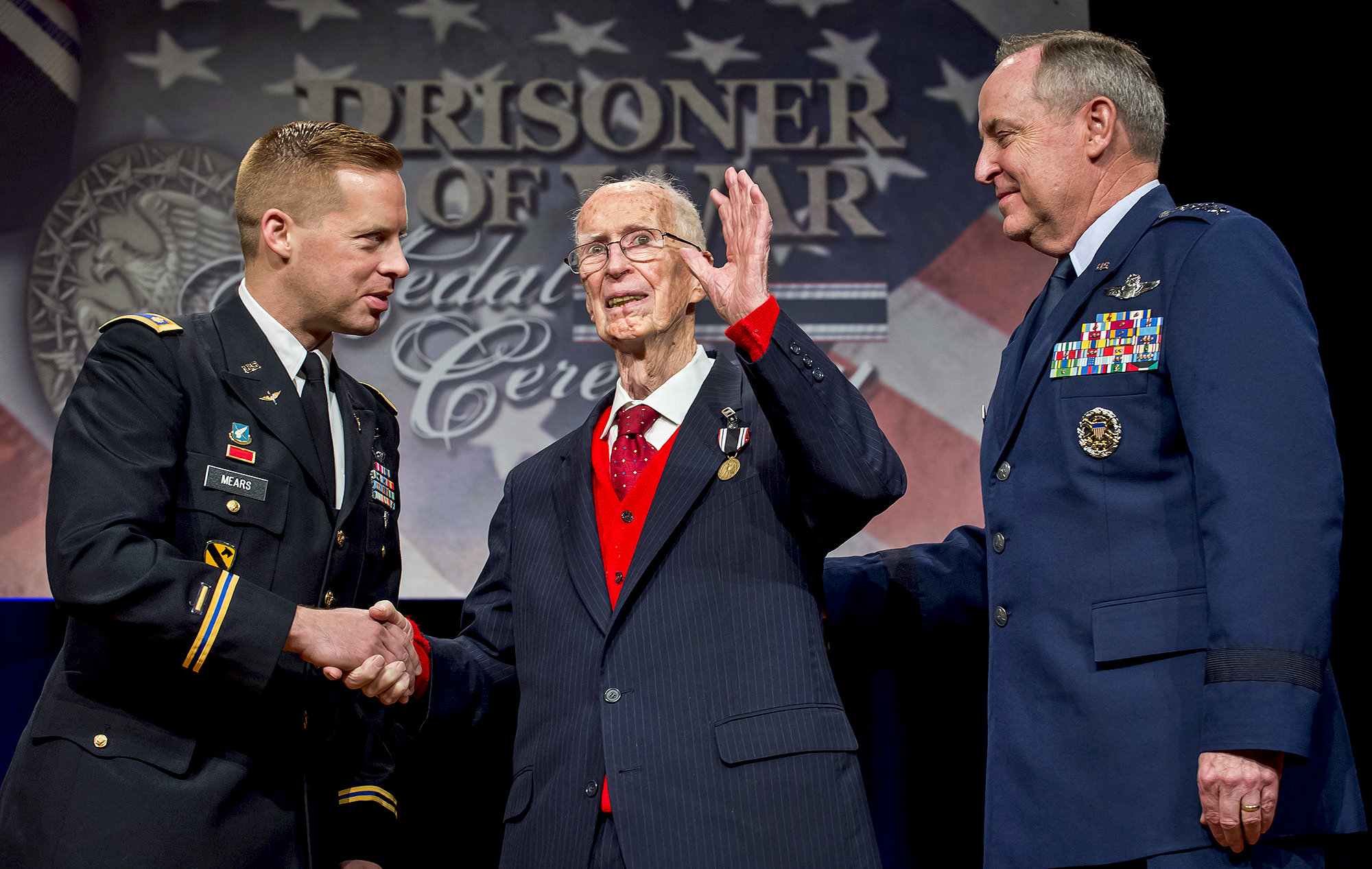 Air Force Chief of Staff Gen. Mark A. Welsh III, right, presents the ...