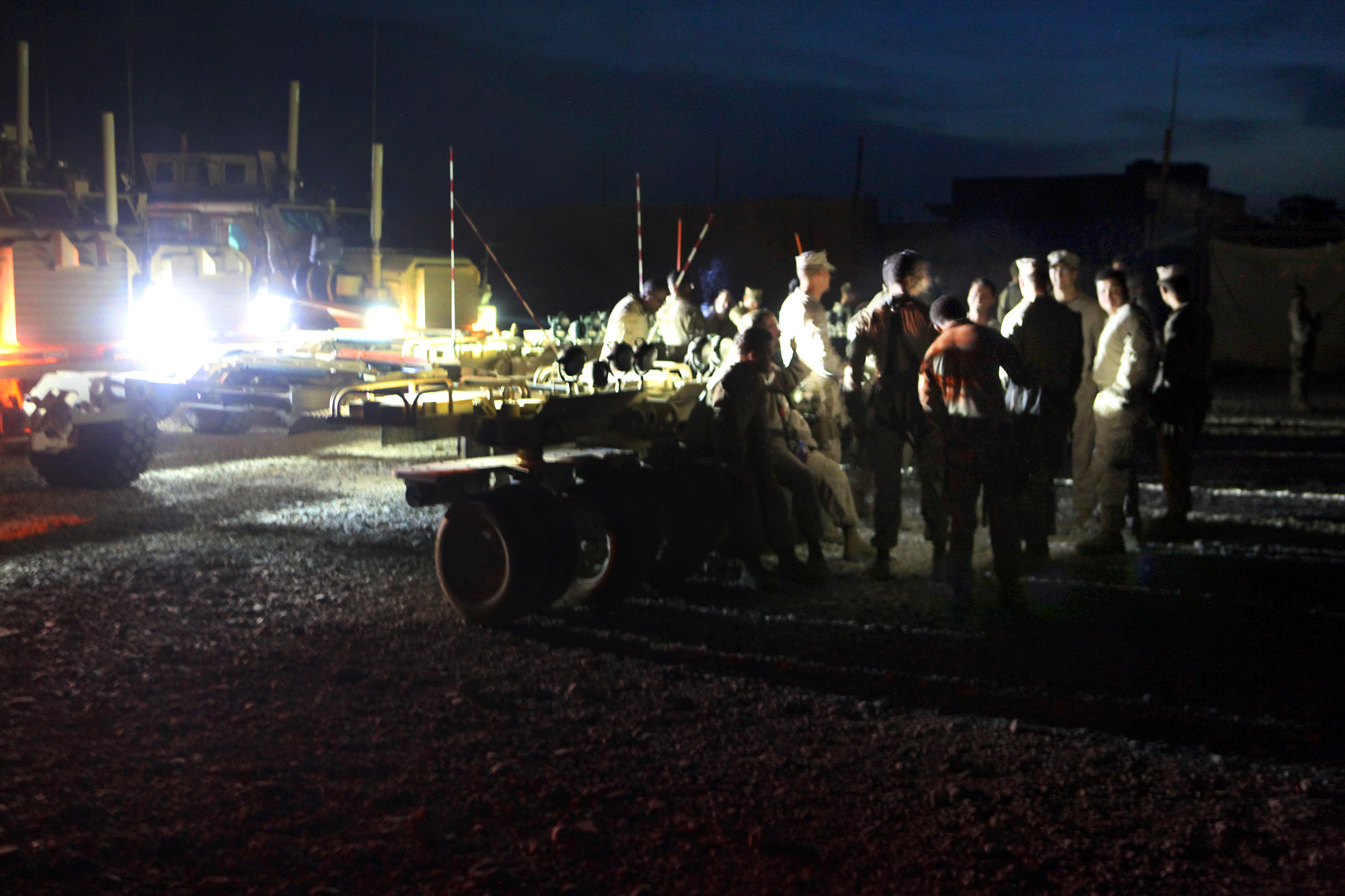 U.S. Marines and sailors prepare to leave Forward Operating Base Nolay ...