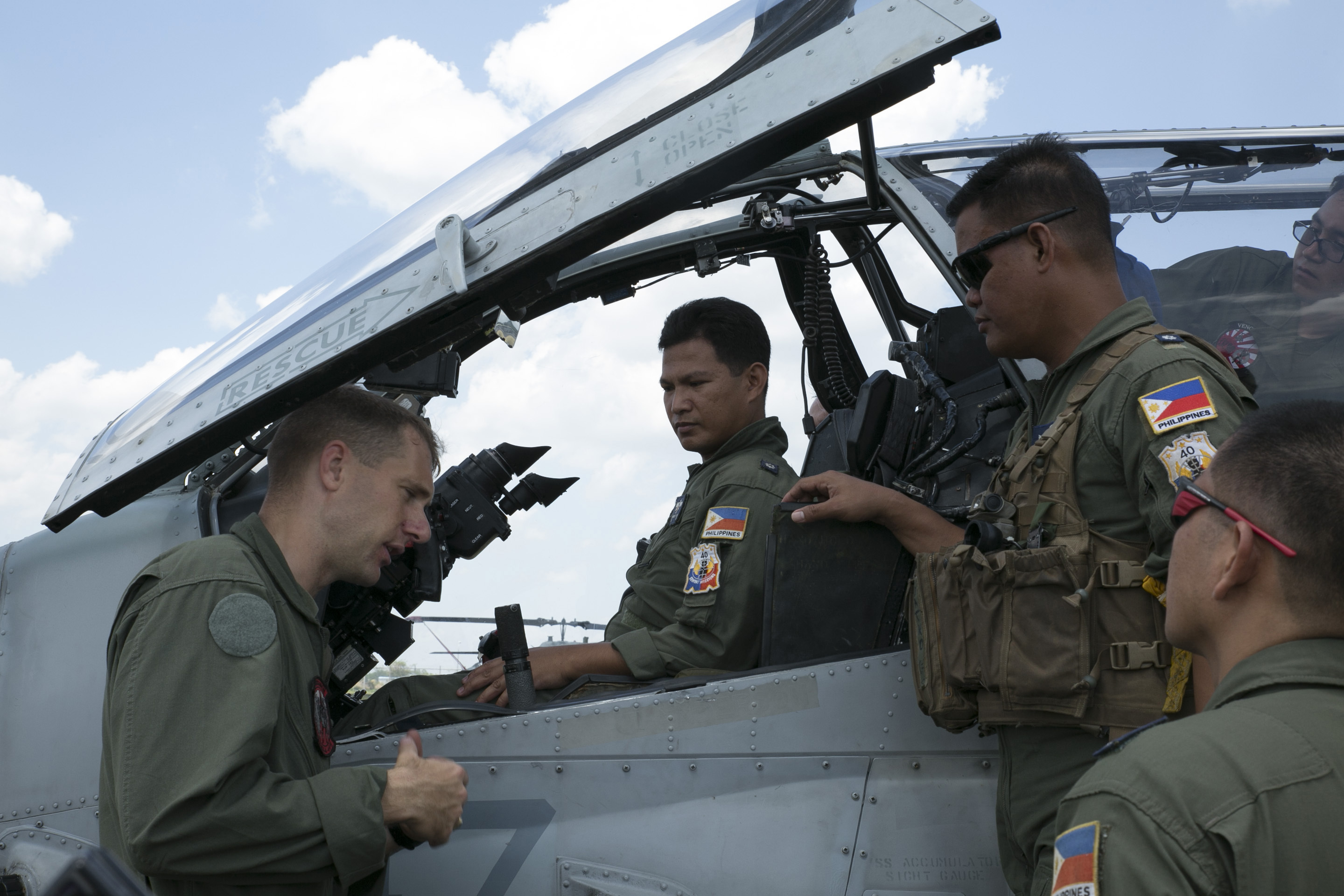 U.S., Philippine attack pilots take off in an AH-1W Super Cobra