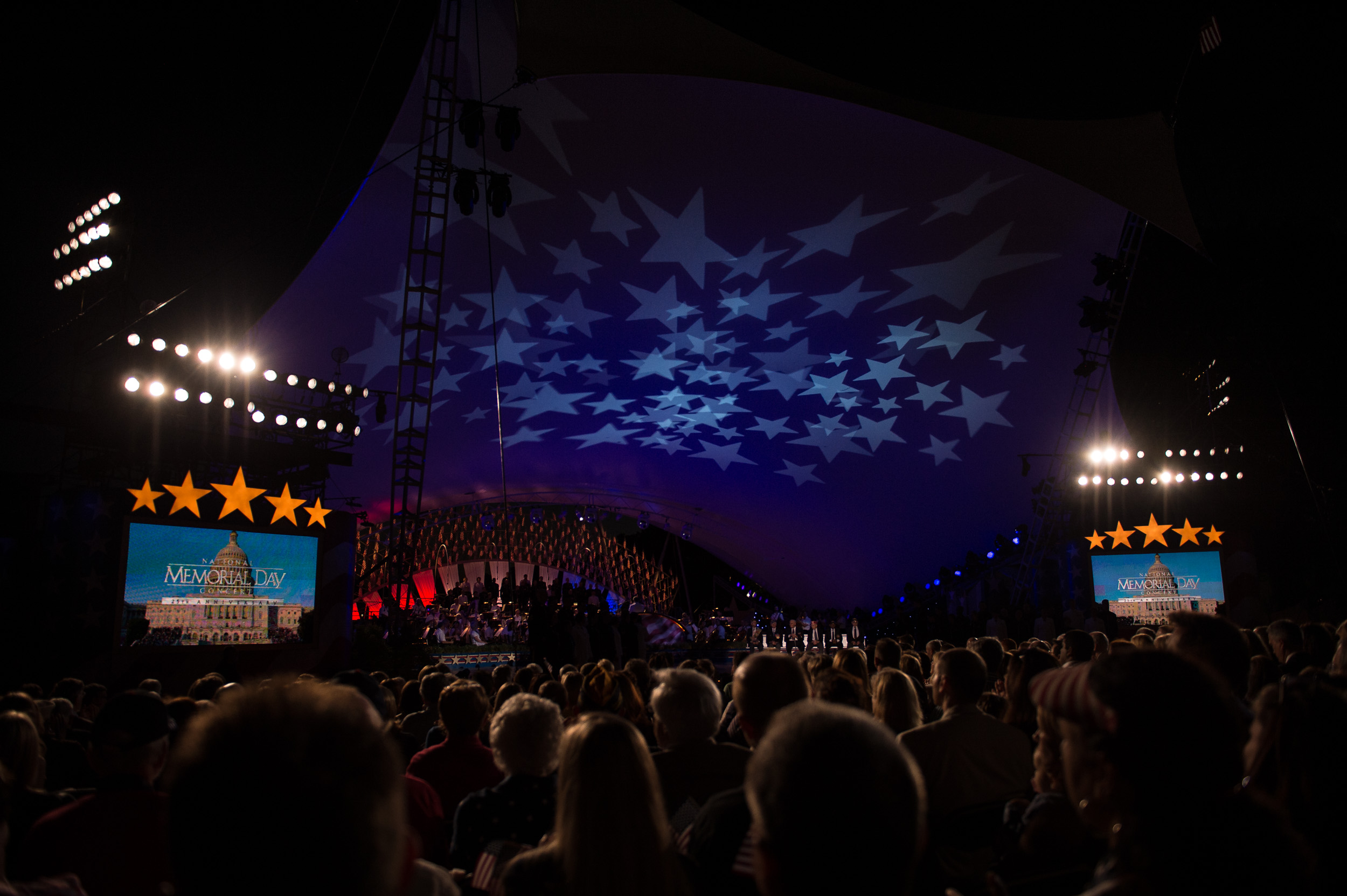 Audience members applaud after honoring World War II veterans during ...