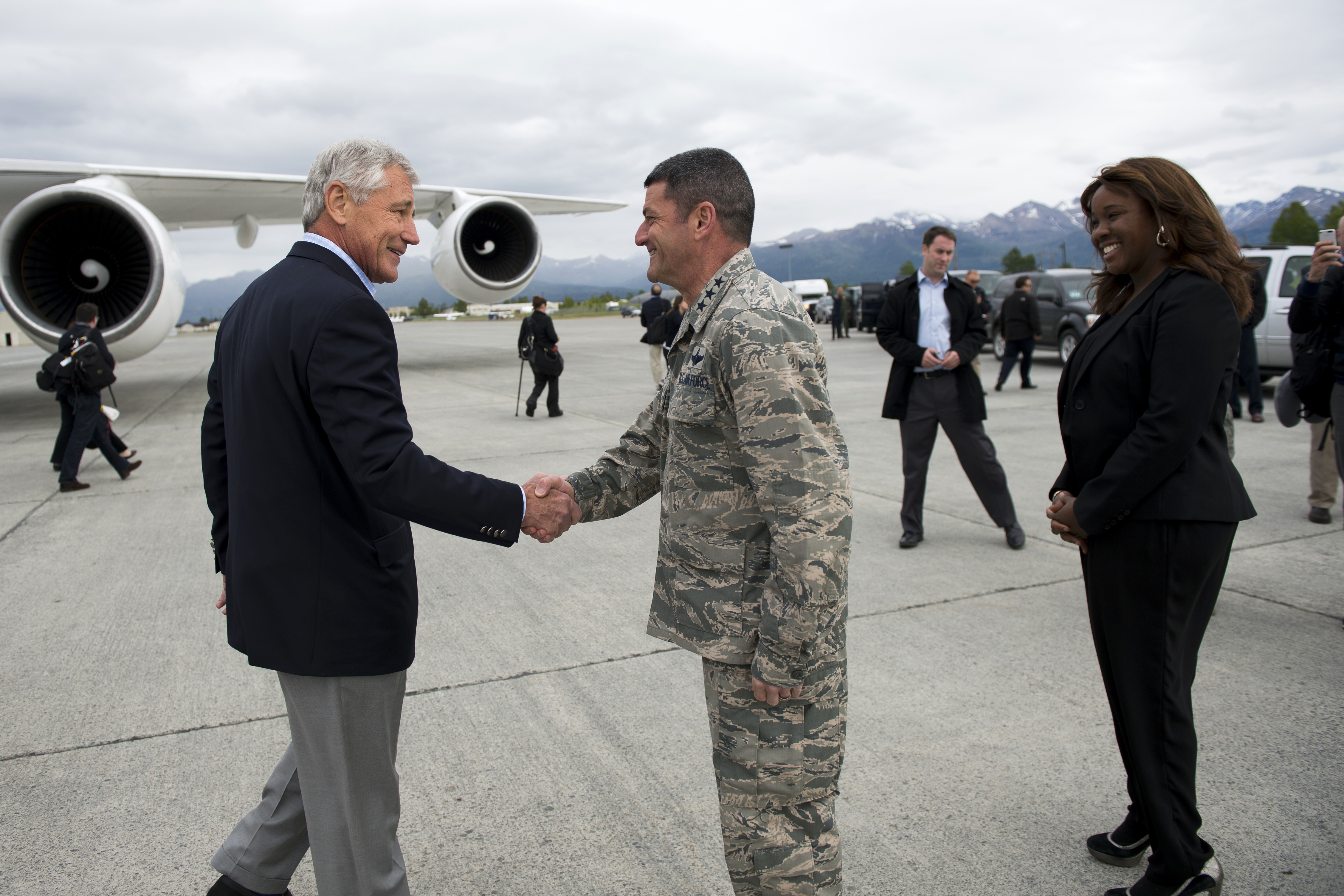 Defense Secretary Chuck Hagel, left, speaks with Air Force Lt. Gen ...