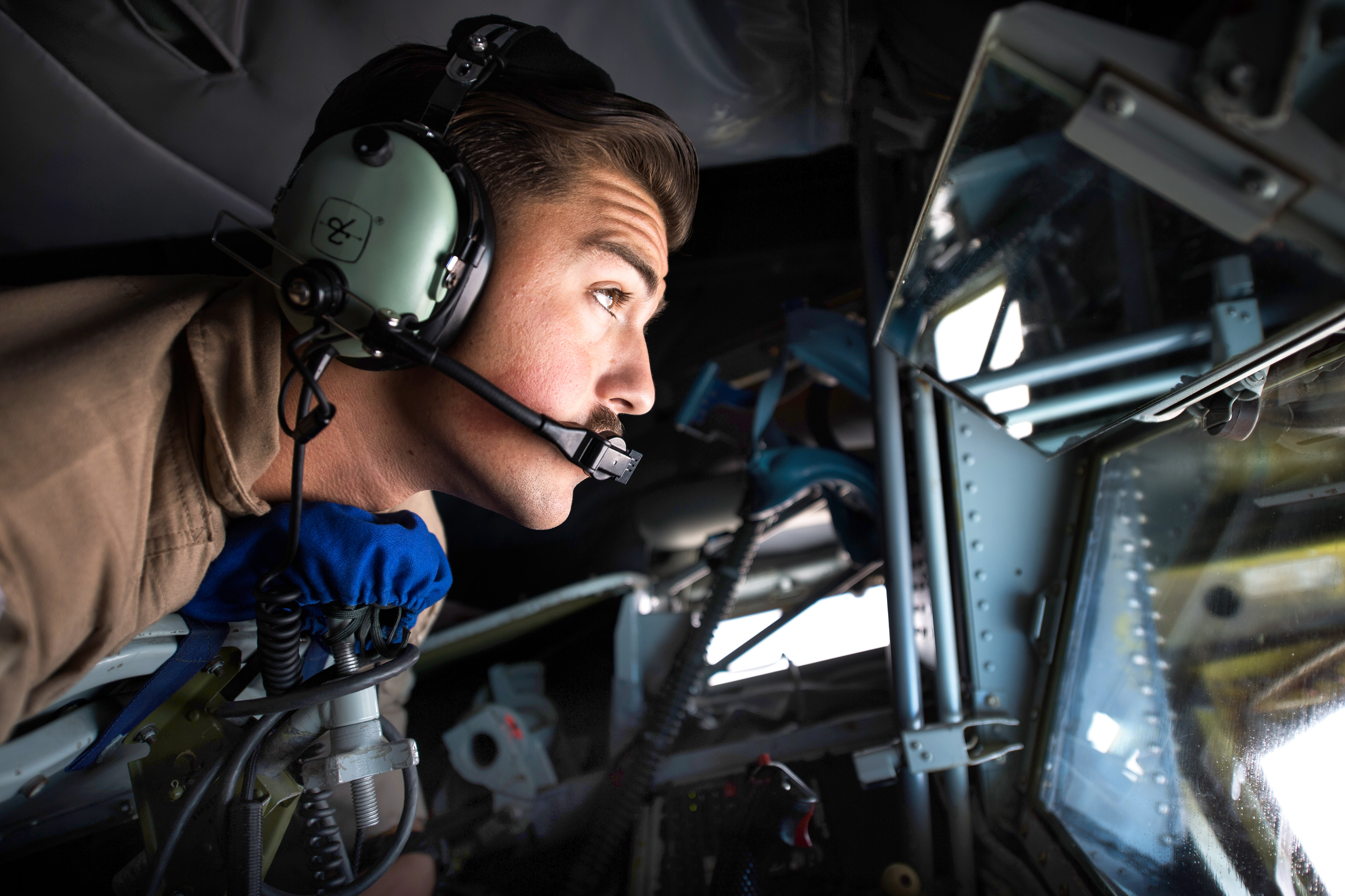 A KC-135 Stratotanker aircraft refuels a Royal Canadian Air Force CF-18 ...