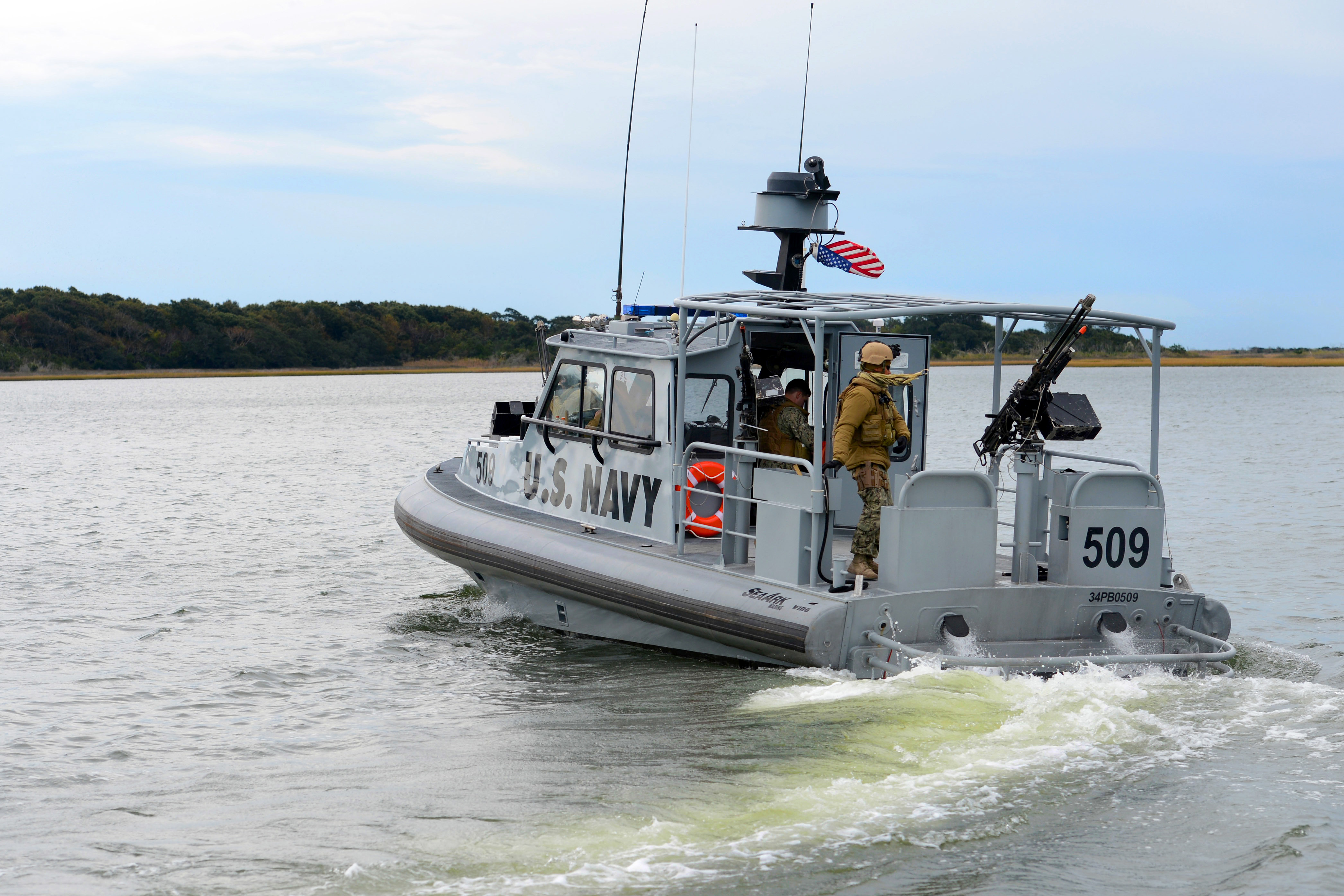 A 34-foot patrol boat assigned to Coastal Riverine Squadron 4 departs ...