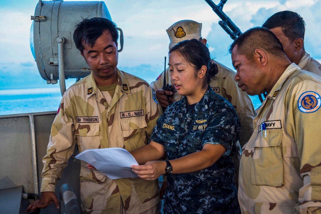 U.S. Navy Lt. j.g. Betty Chang from Portland, Oregon, assigned to the ...