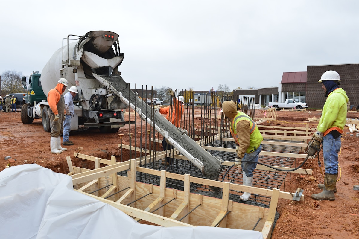 Construction workers begin pouring foundations > IGB Training ...