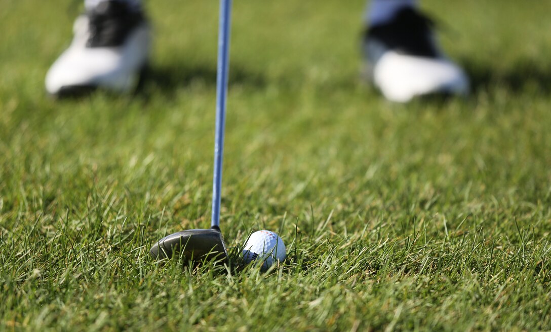 Golf Tournament: Setting up the shot