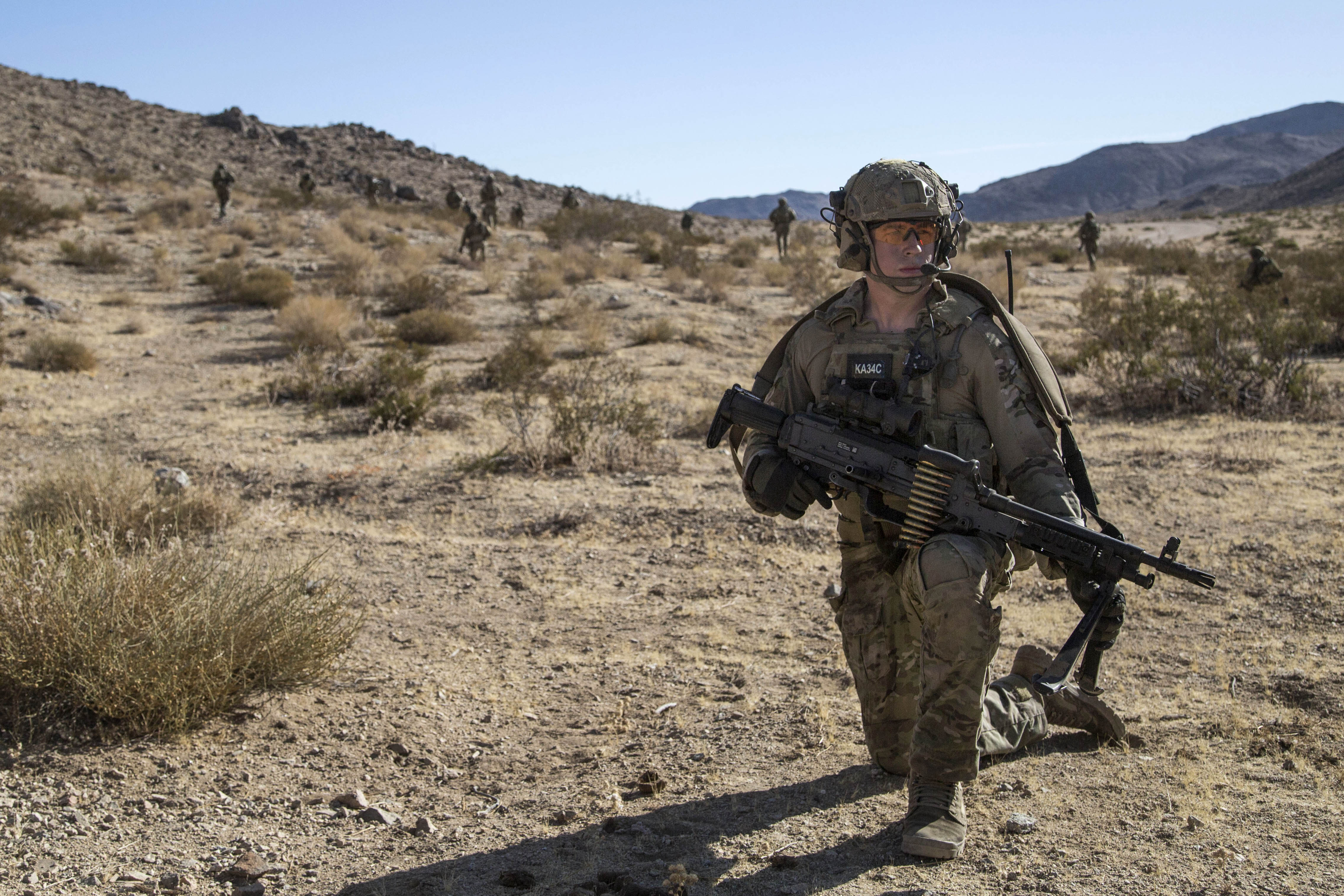 An Army Ranger provides rear security before conducting a raid on an ...