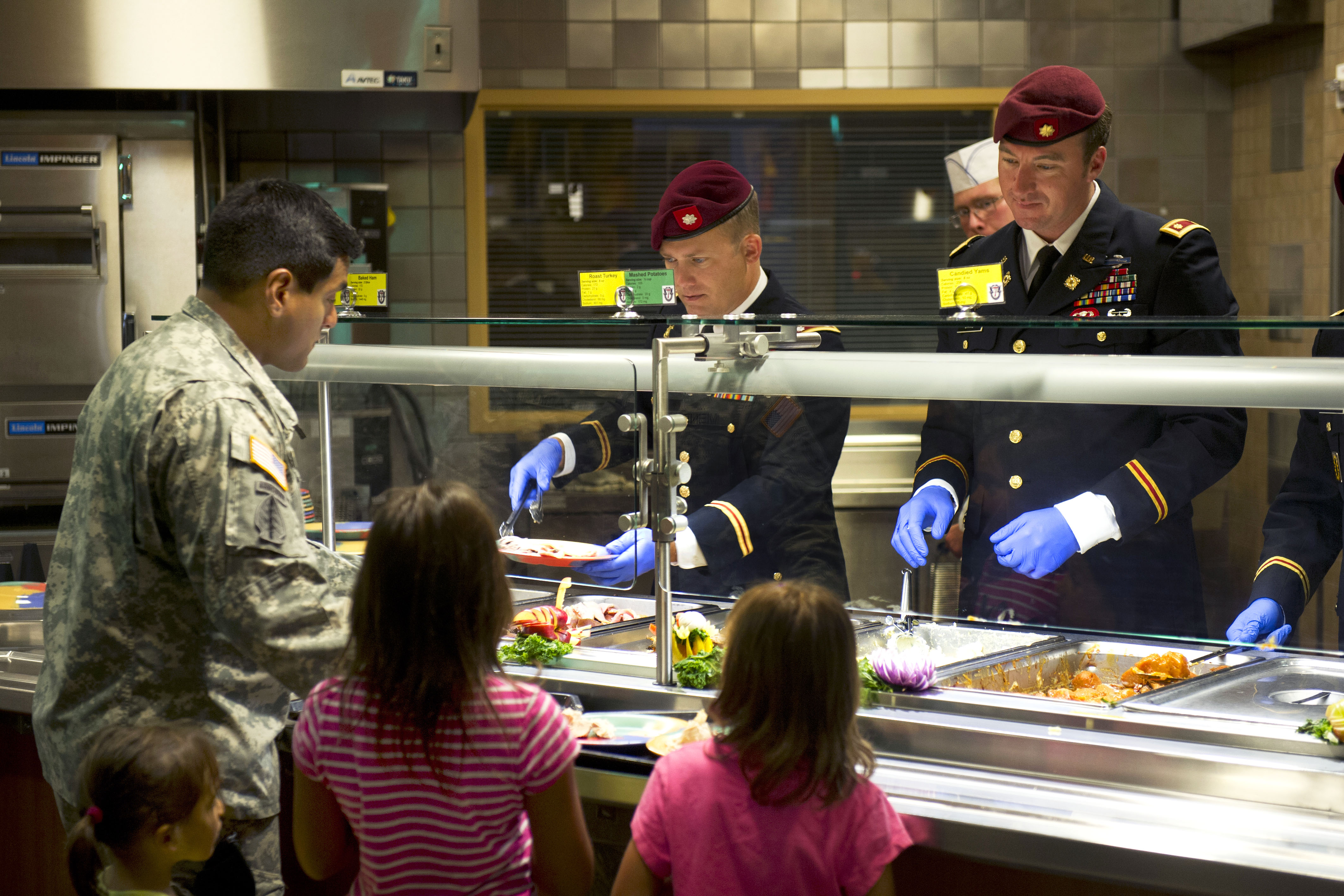 Army Lt. Col. Tandy Brown, center, commander of the 7th Special Forces ...