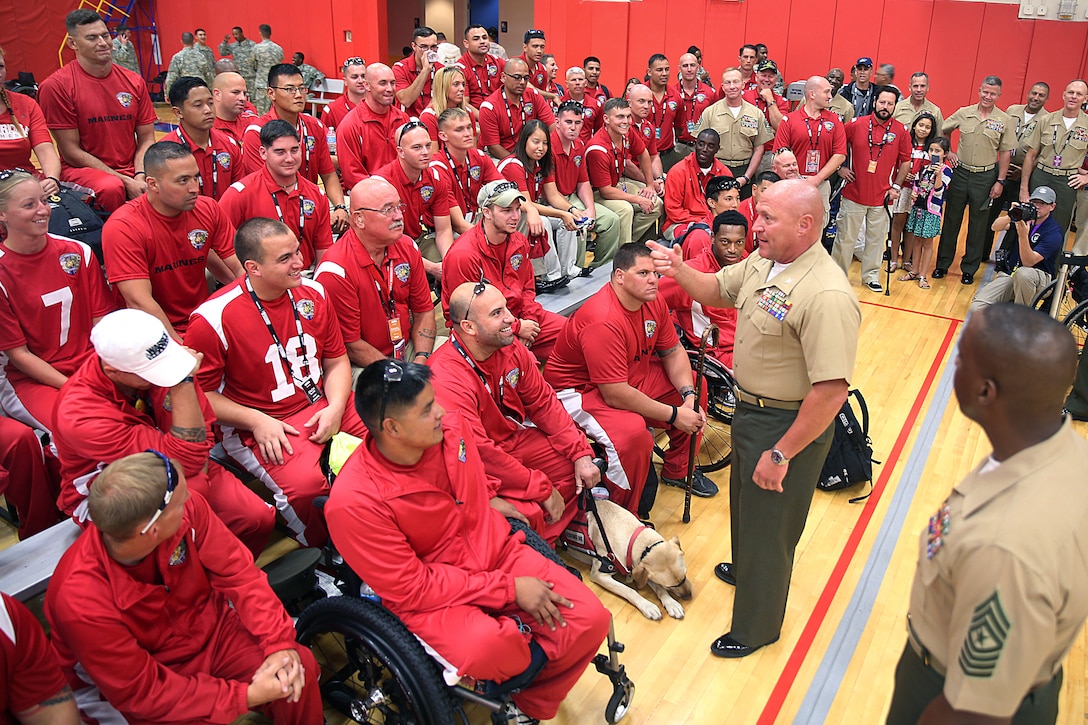 Marine Corps Col. T. Shane Tomko, center right, commanding officer of ...