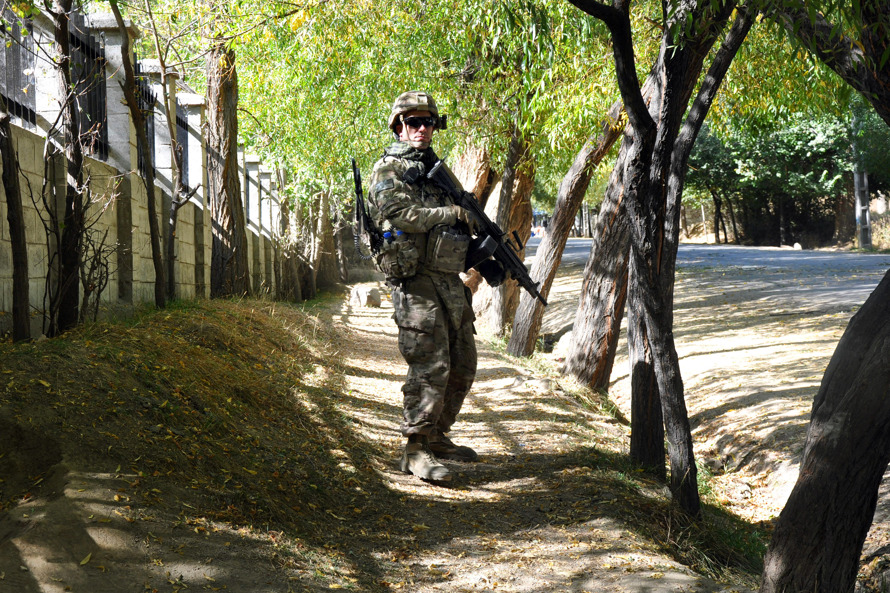 U.S. Army Staff Sgt. Steven Tessitore provides rear security during a ...