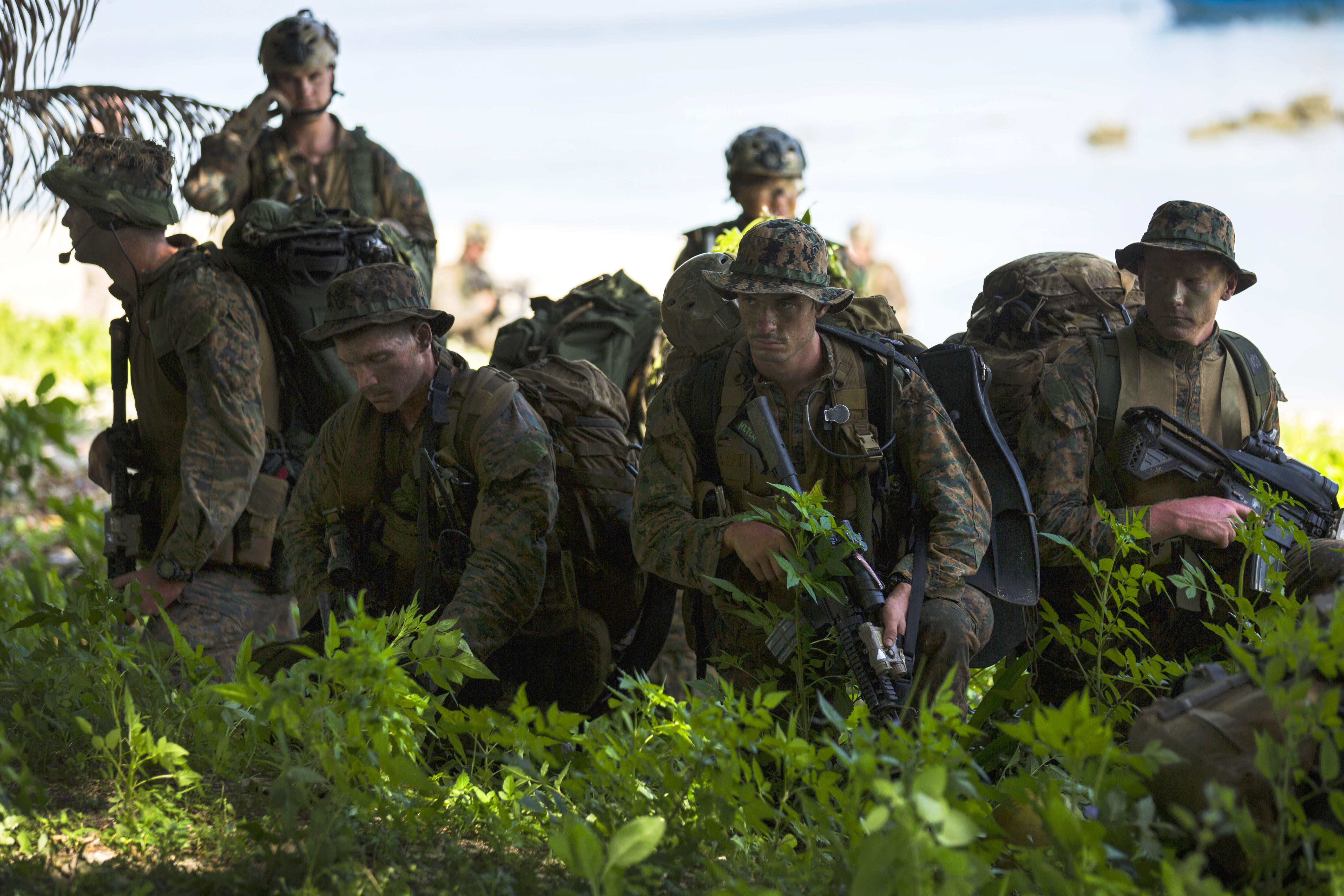 U.S. Marine Corps reconnaissance swimmers provide security during a ...