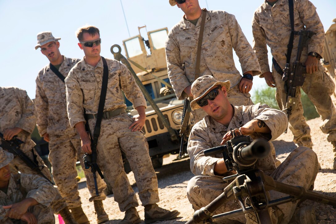 Marine Corps Cpl. Joshua Westlake, bottom right, instructs Marines and ...