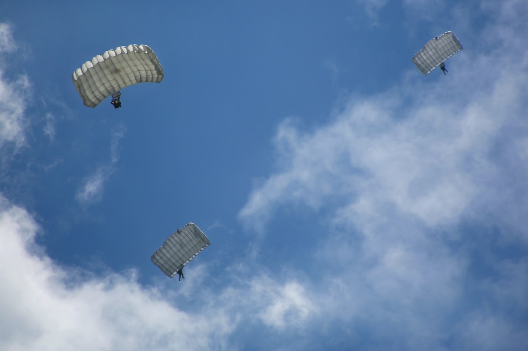 Philippine Marines parachute after jumping from a U.S. Marine Corps CH ...