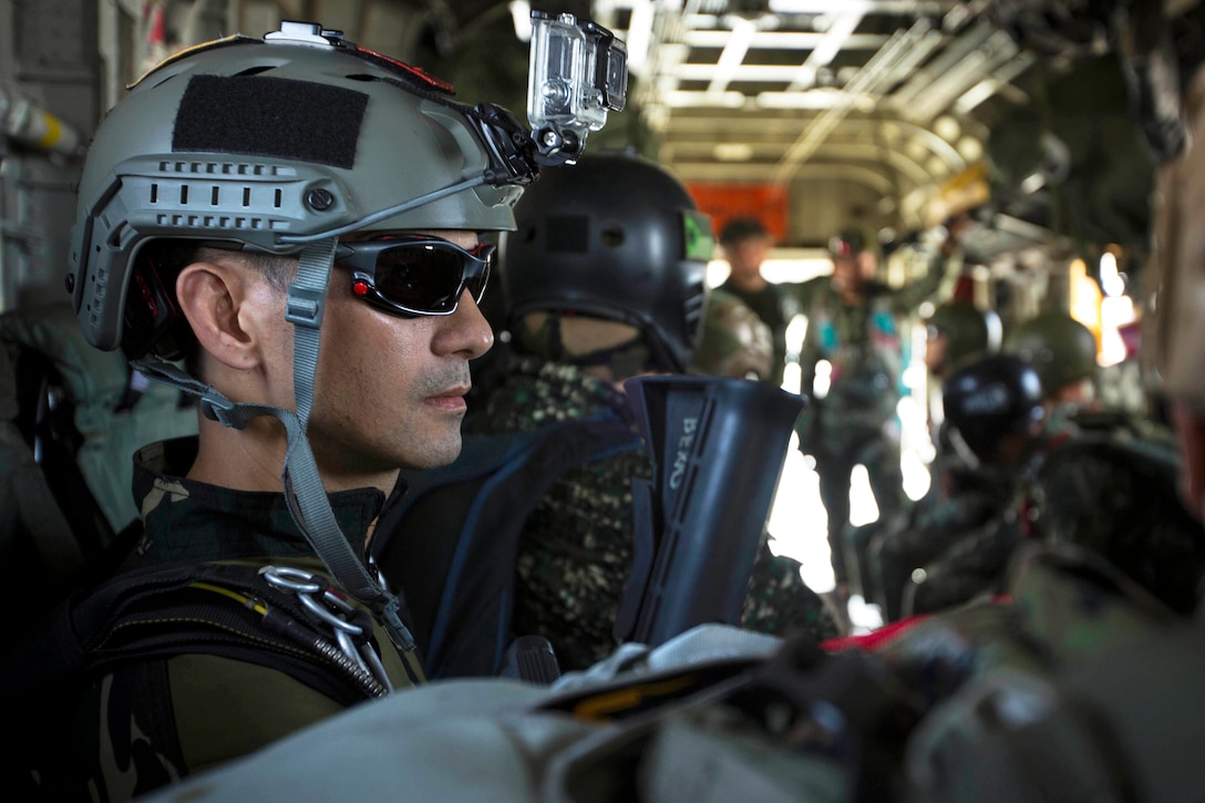 Philippine Petty Officer 2nd Class Daniel Tan flies in a U.S. Marine ...