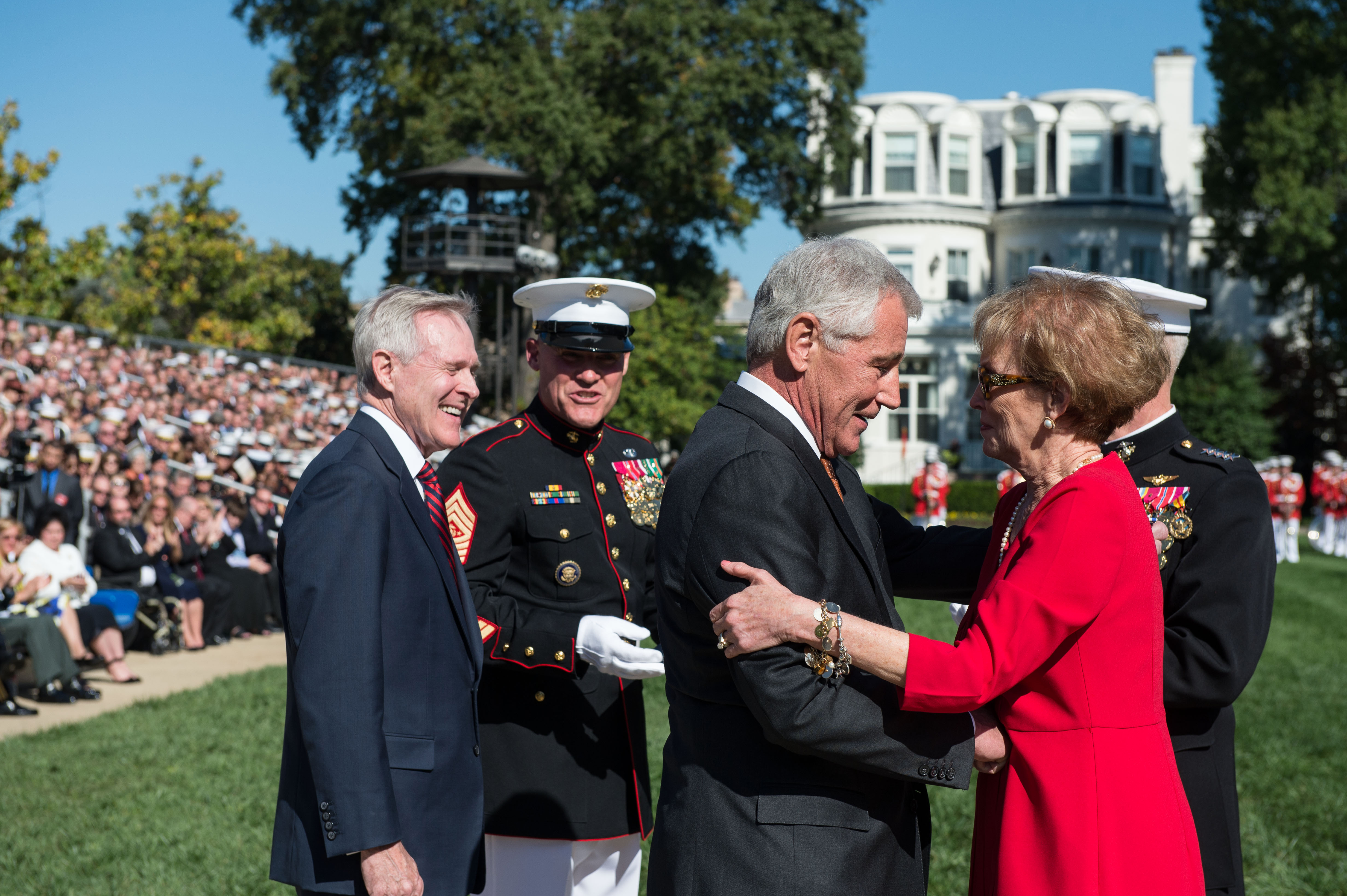 Defense Secretary Chuck Hagel hugs Bonnie Amos, wife of Commandant of ...