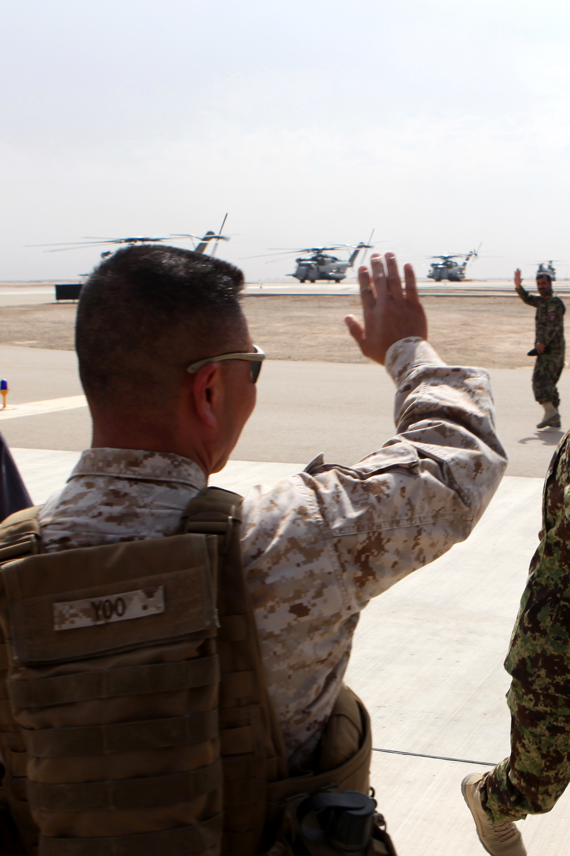 U.S. Marine Corps Brig. Gen. Daniel D. Yoo, foreground, commanding ...