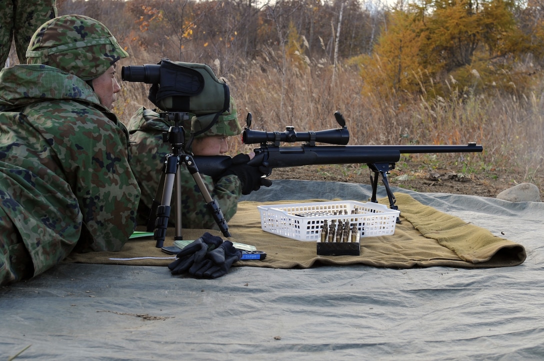 A sniper from the Japan ground self-defense force takes aim at a target ...