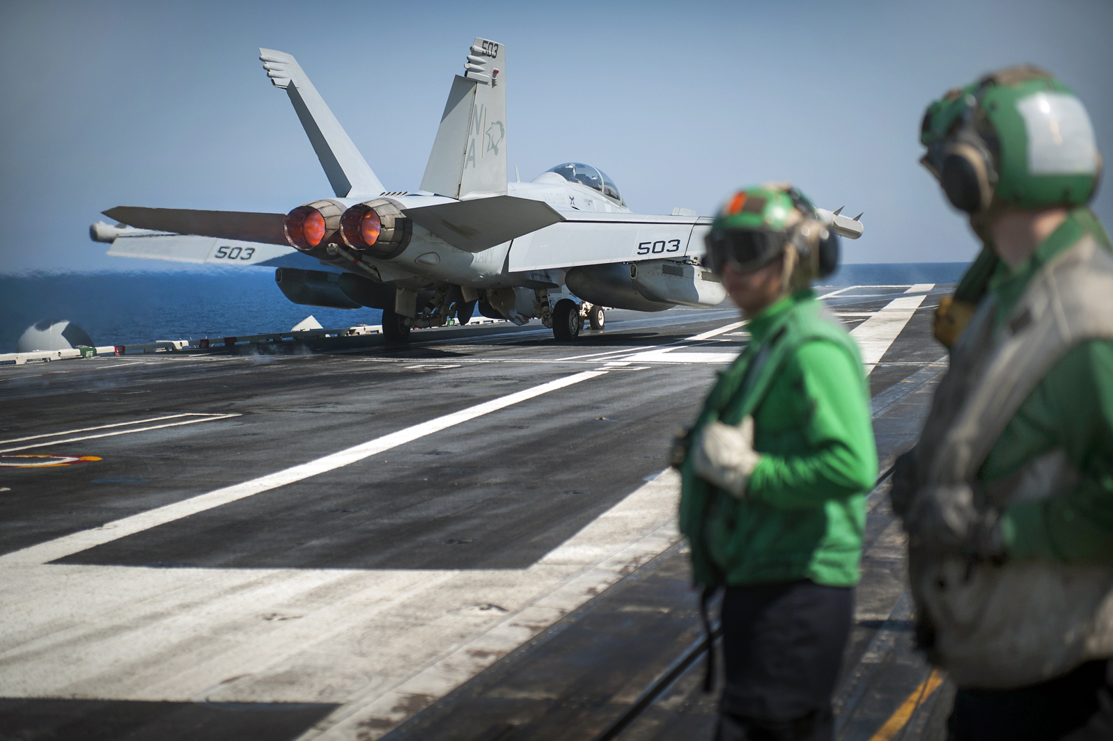 An EA-18G Growler from Electronic Attack Squadron 139 launches from the flight deck of the ...