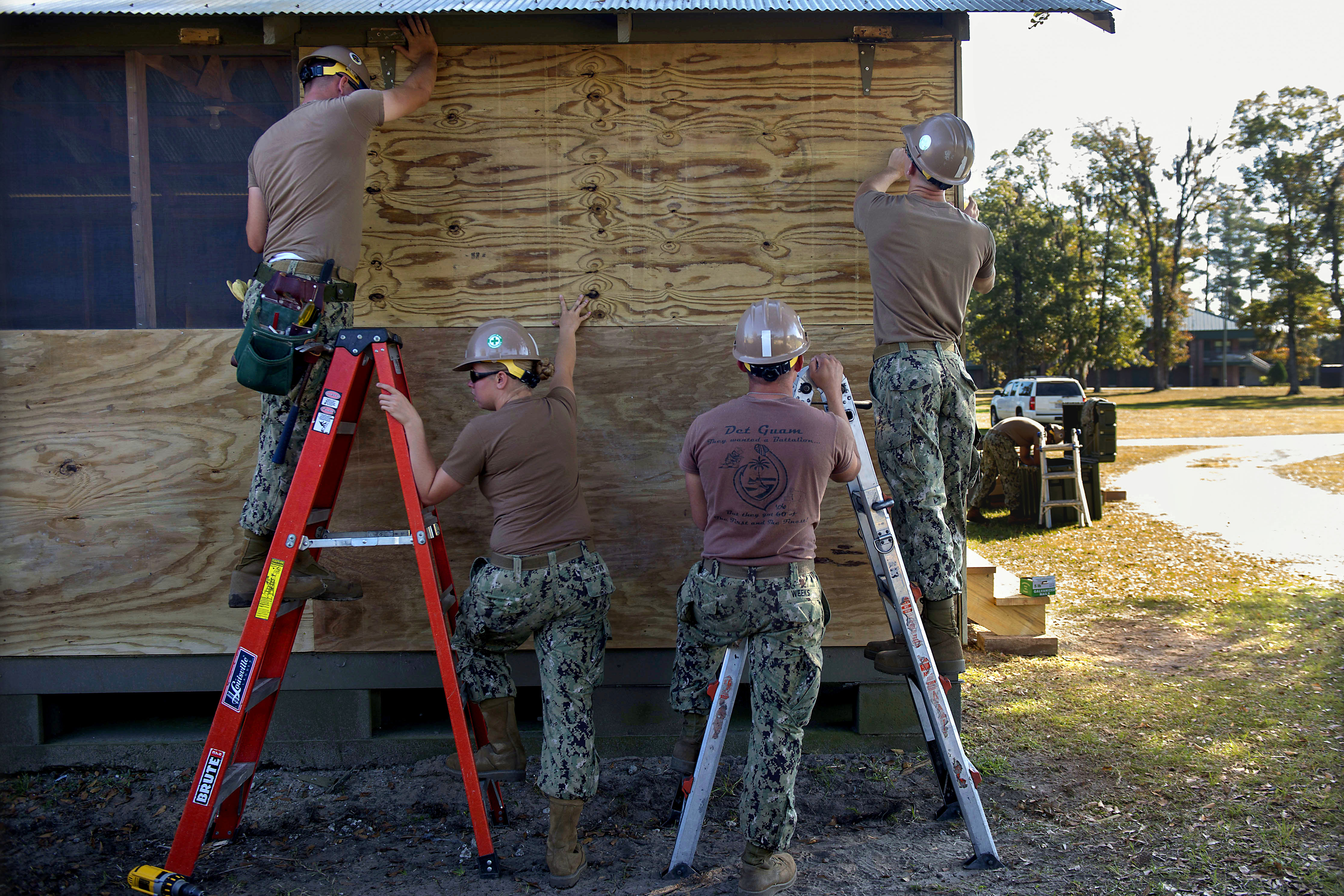 Navy Seabees conduct renovations of Southeast Asian huts on Marine ...