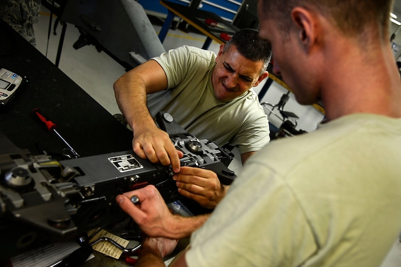 Armament systems technicians maintain F-22 weapons systems > Joint Base ...