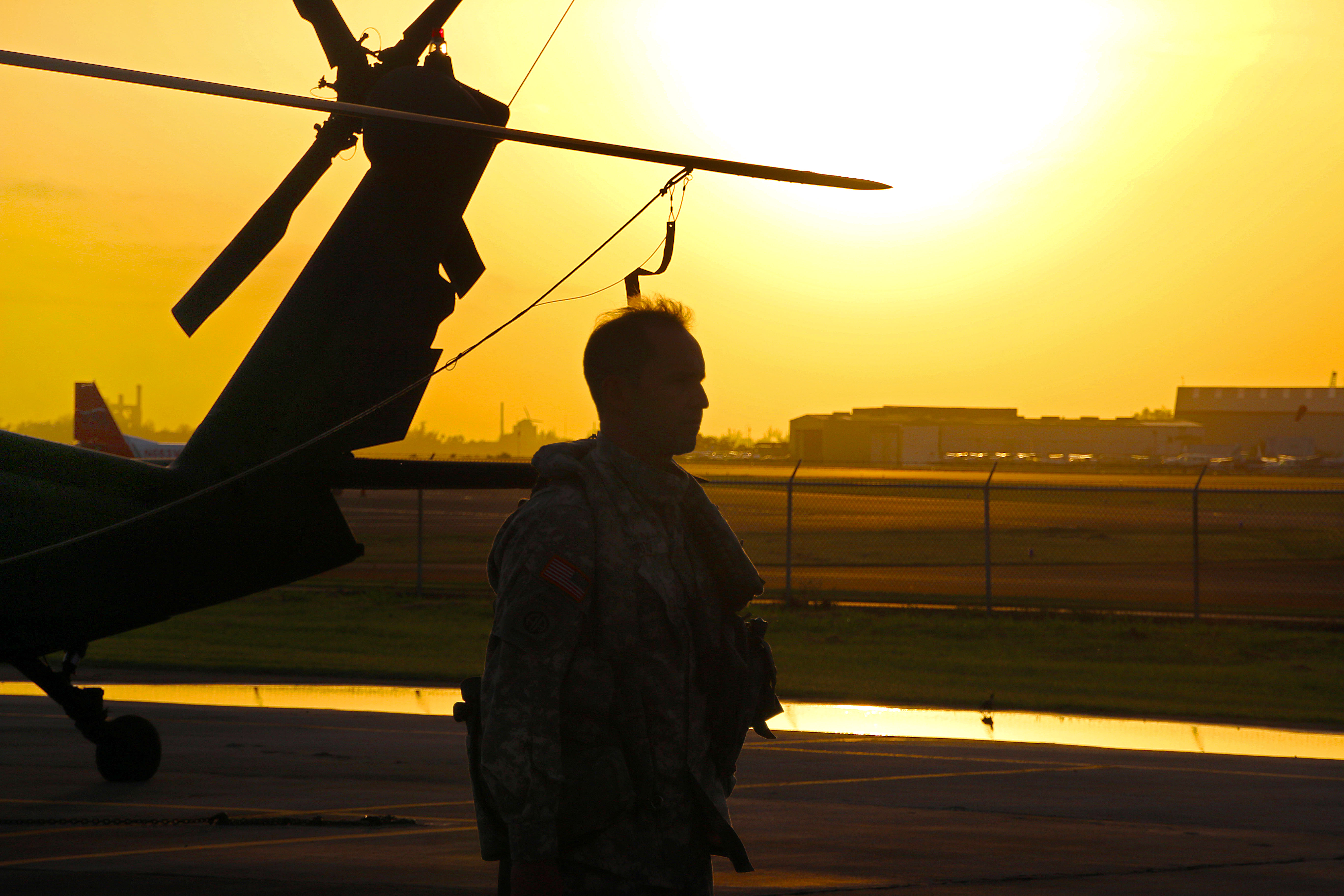 Army Chief Warrant Officer 3 Leonardo Soto walks to his UH-60 Black ...