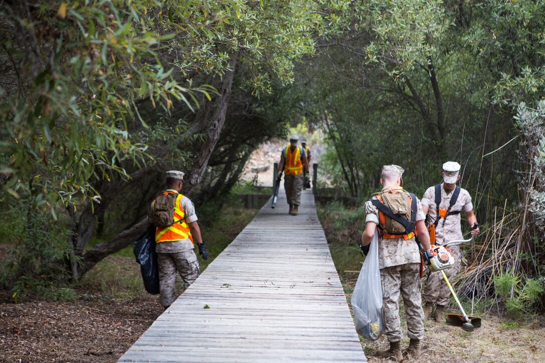 Service members conduct cleanup aboard MCAS Miramar