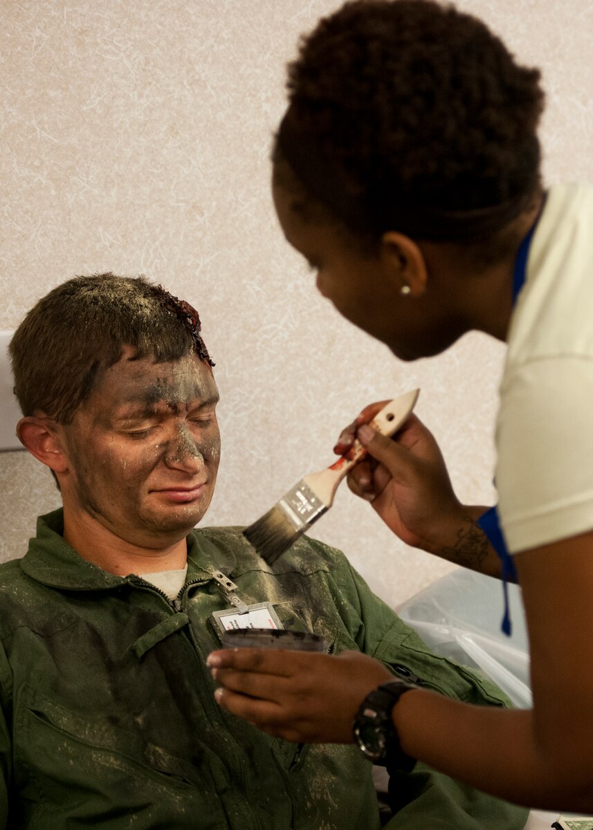 Moulage team adds gory reality to base exercises > 919th Special ...