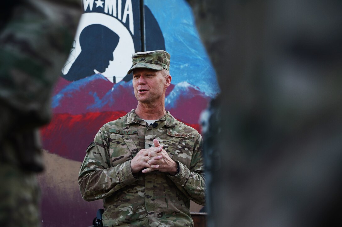 U.S. Air Force Brig. Gen. Mark D. Kelly speaks during a retreat and re ...