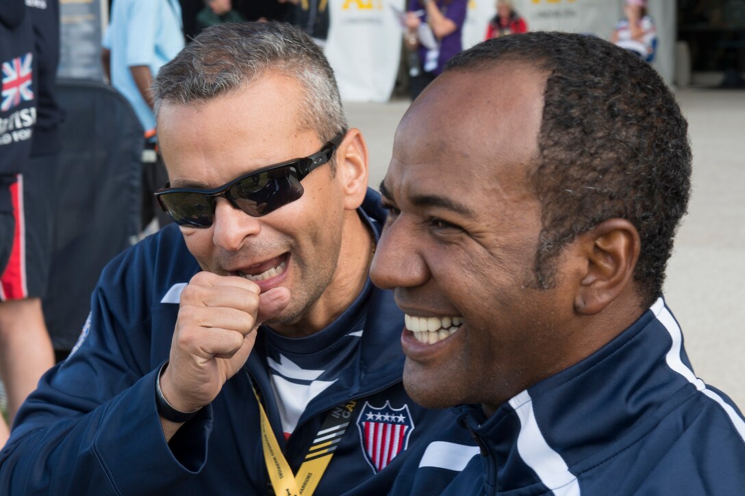 U.S. Army Maj. Ivan Castro, left, conducts a mock interview with U.S ...