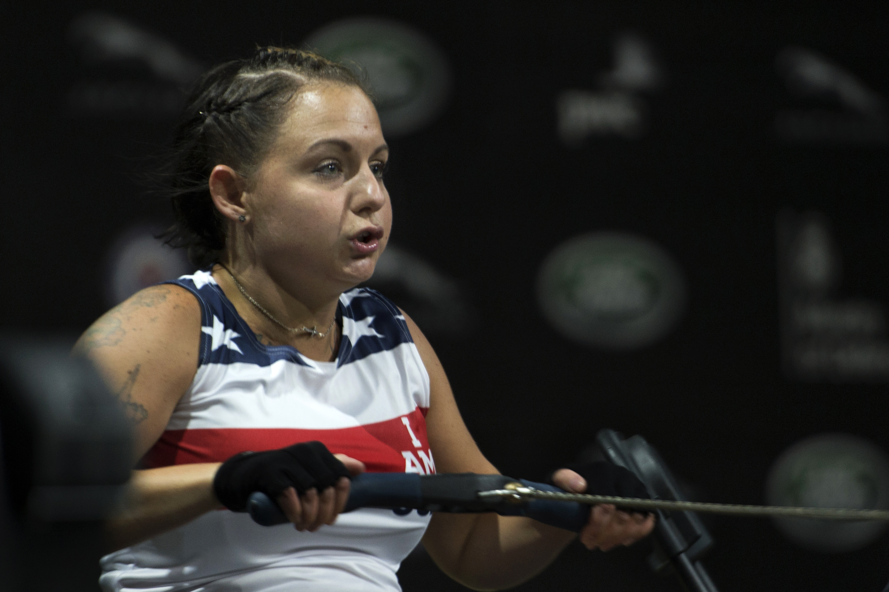 U.S. Air Force Staff Sgt. Melissa Coduti competes in indoor rowing ...