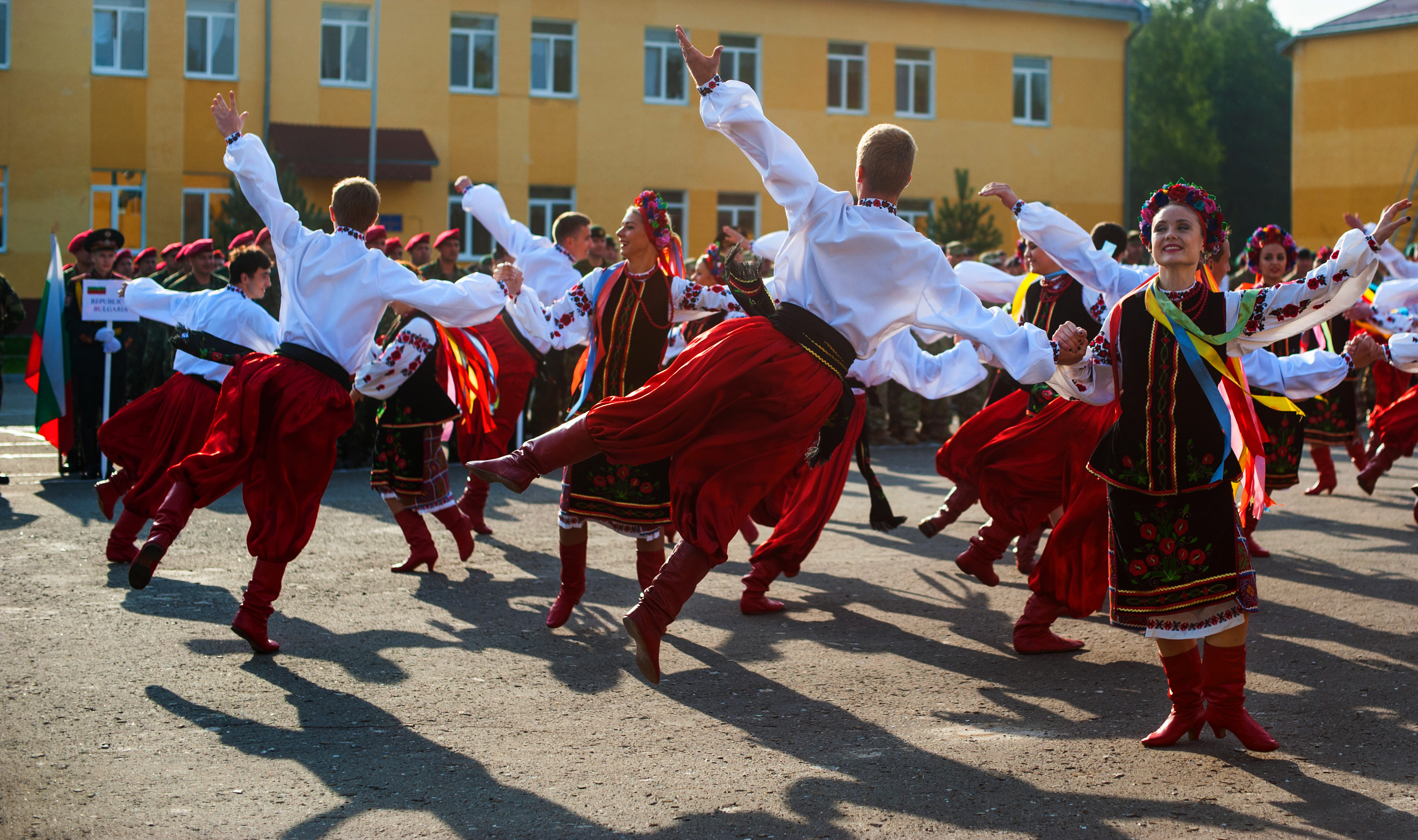 Ukrainian dancers perform a traditional routine for the participants ...