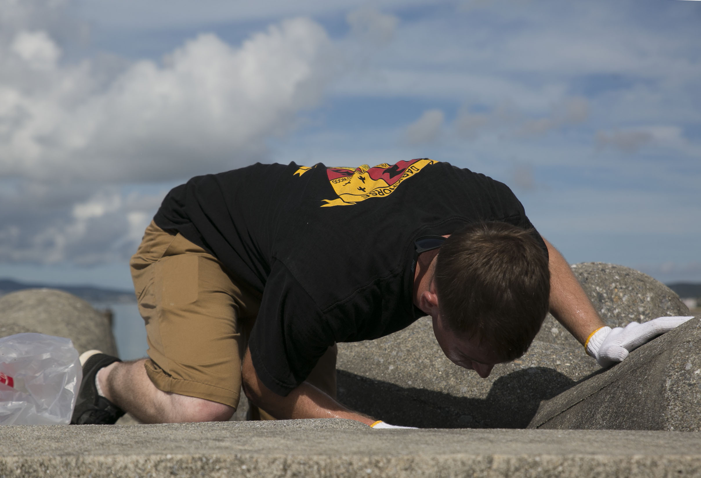 Community members, Marines, sailors come together for beach cleanup ...