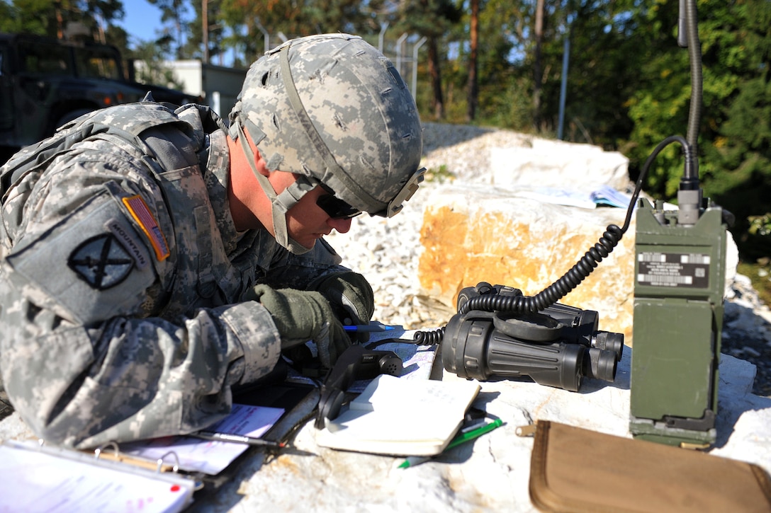 U.S. Army Staff Sgt. Cory Walter conducts observation post operations ...