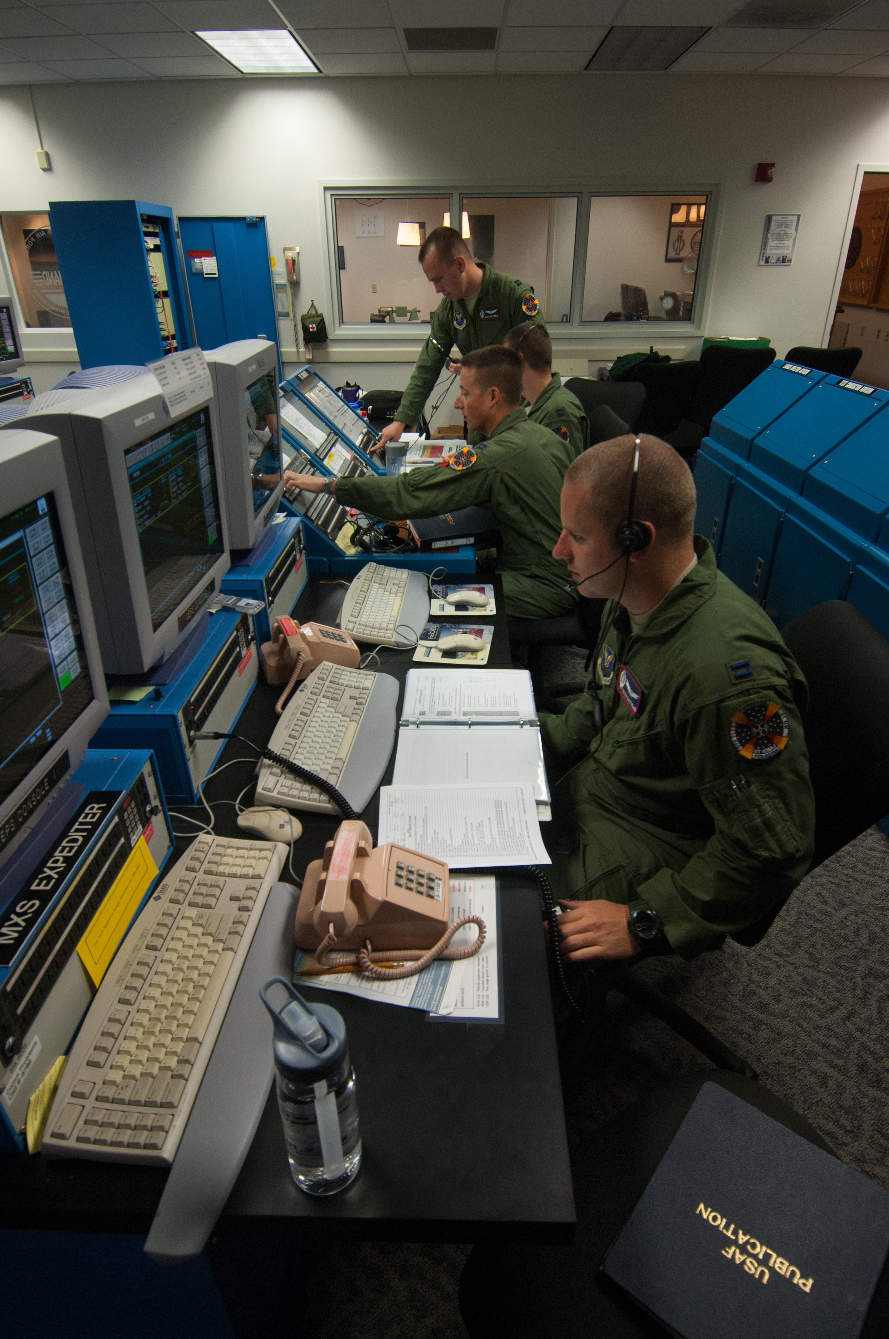576th Flight Test Squadron Airmen run a series of systems checks on a ...