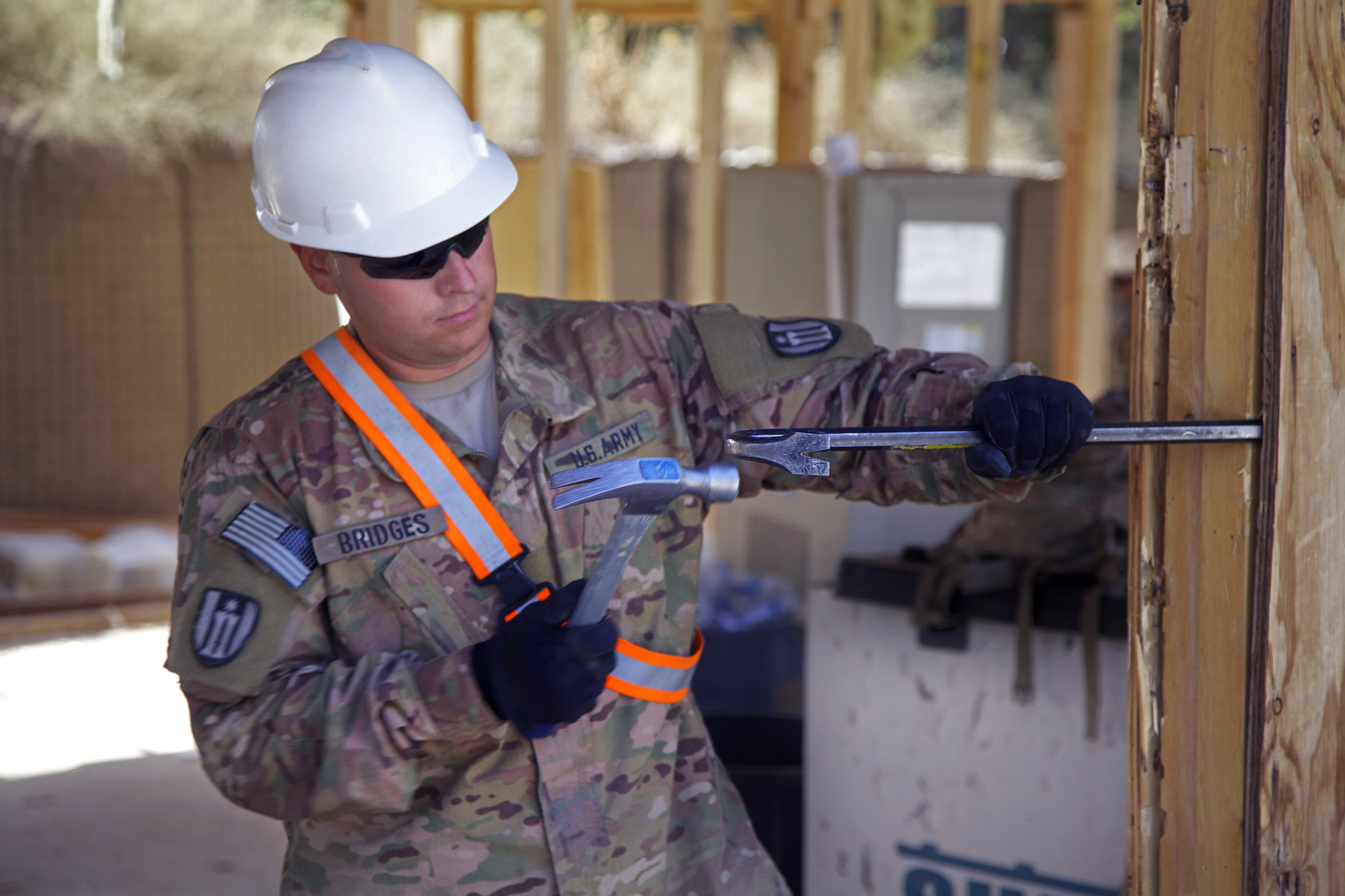 U.S. Army Pvt. Daniel Bridges tears down an older building on Bagram ...