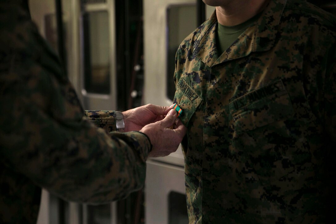 Marine receives Navy Achievement Medal in Korea