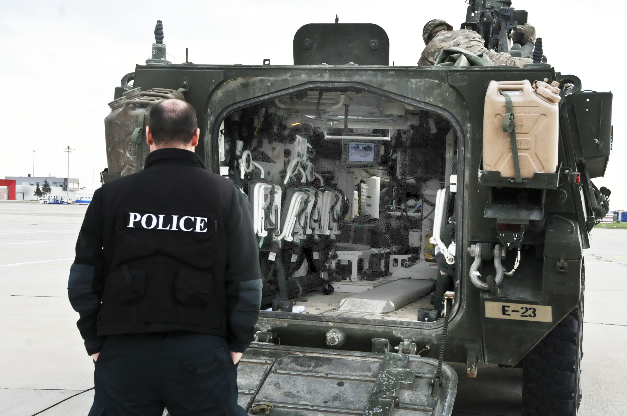 A military police officer assigned to Bulgarian Land Forces surveys a ...